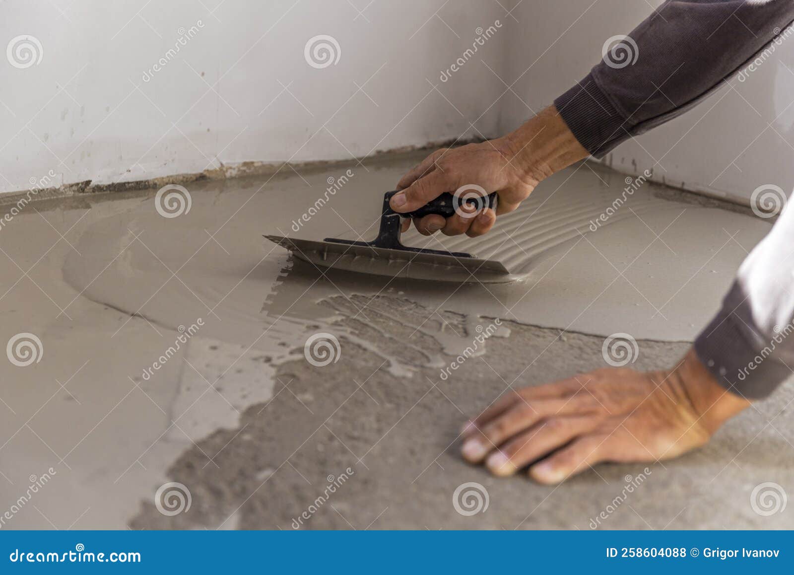 Grey Self-leveling Screed, New Floor Layer, Man Hand Stock Photo ...