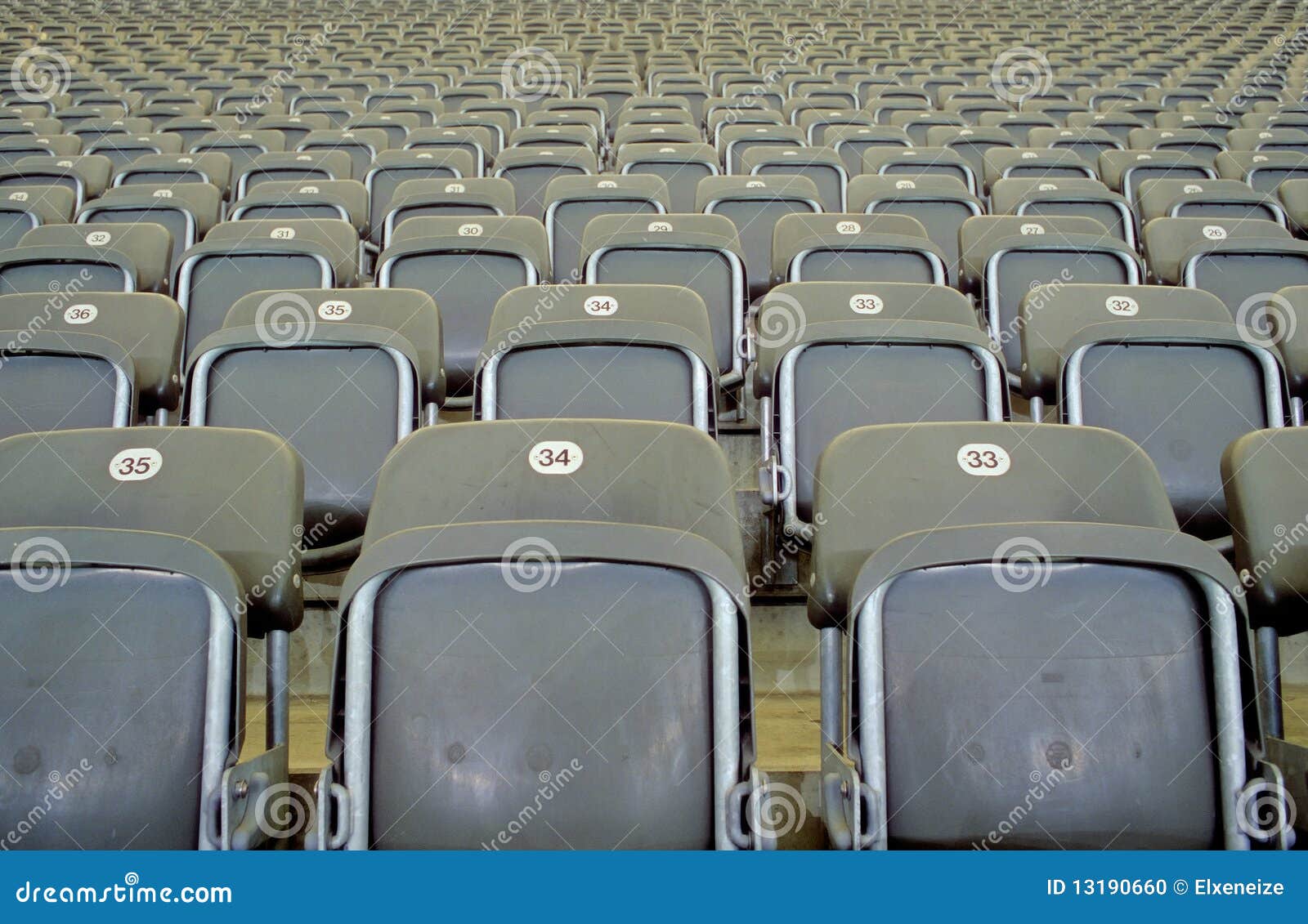 Grey stadium seats stock photo. Image of event, game - 13190660