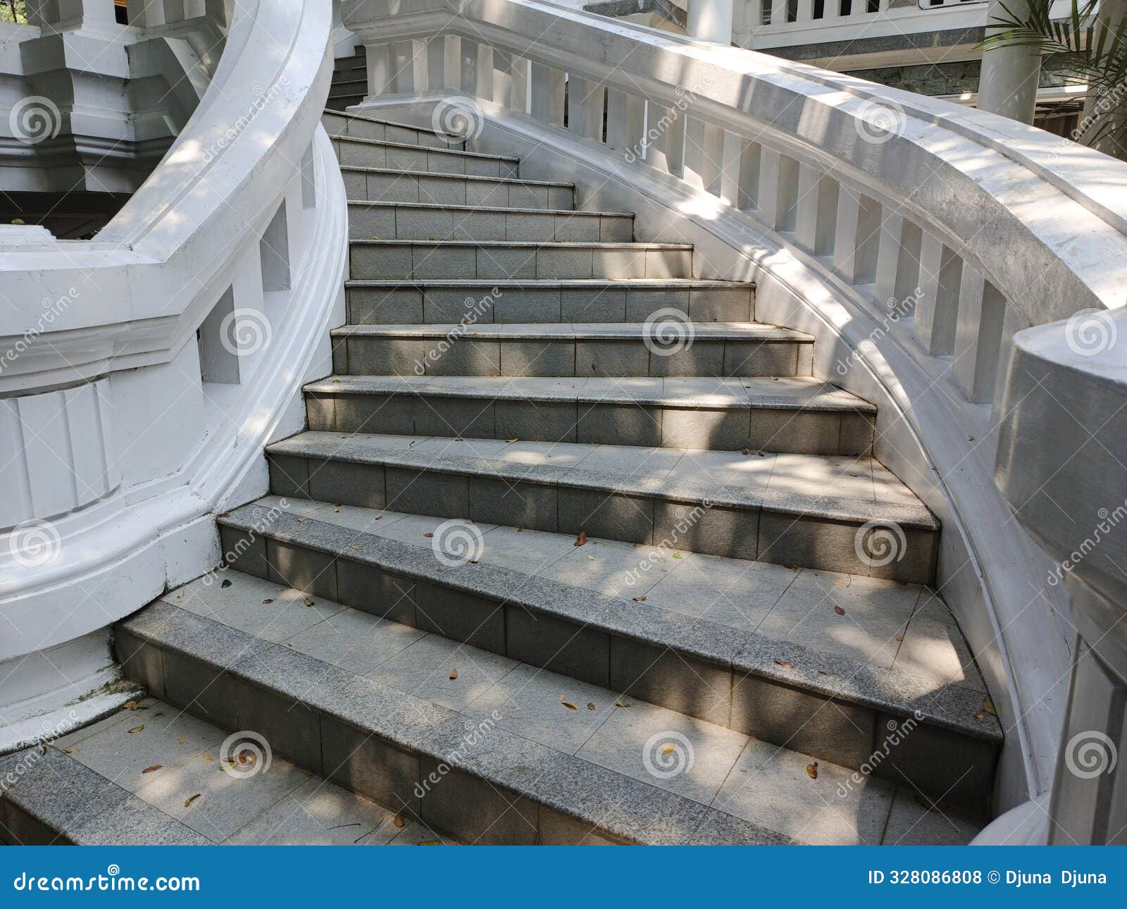Grey Steps and White Railings on a Curved Staircase Stock Photo - Image ...