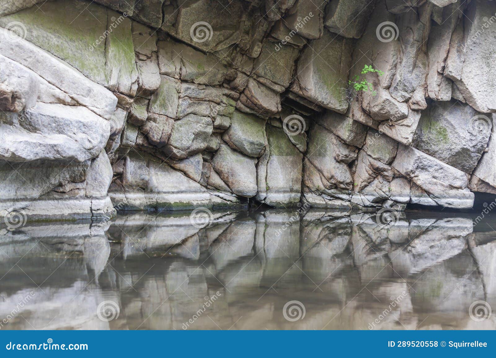 Stone Walls by the Water and Reflections in the Water Stock Photo ...