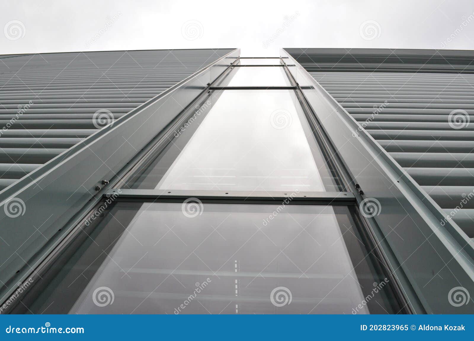 A Grey Wall with a Bottom Glass Window Stock Image - Image of glass ...