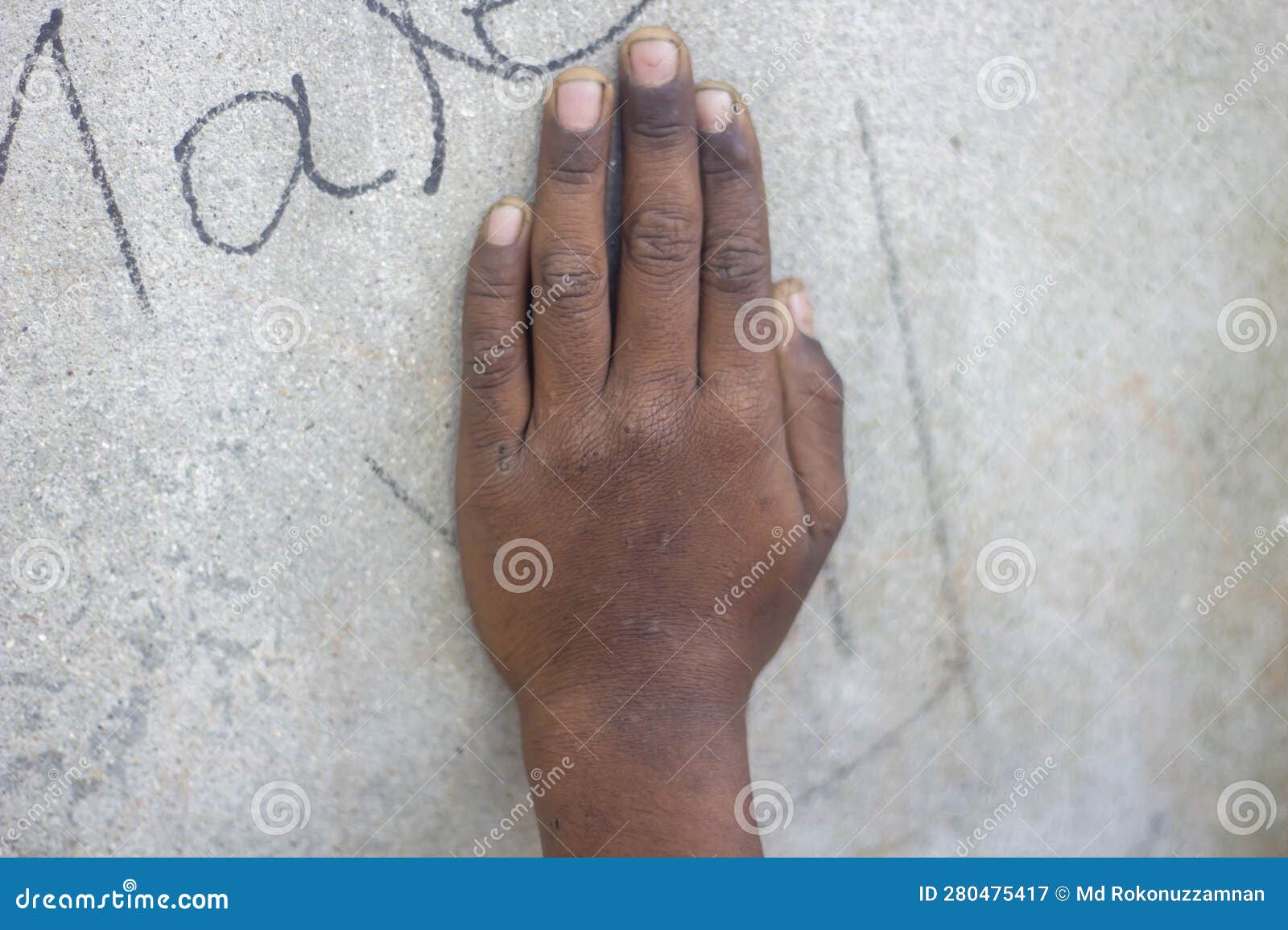 A Grey Wall Has Black Human Hands on it Stock Image - Image of focus ...