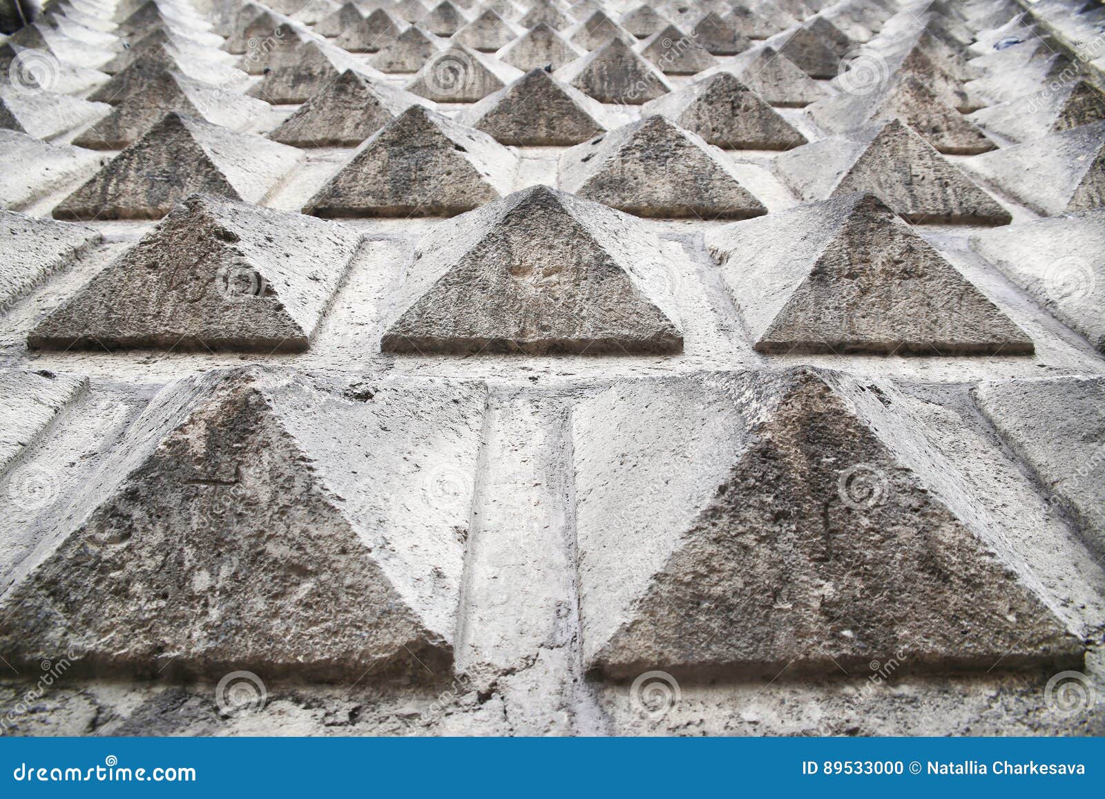 Grey Wall with Pyramid Texture Stock Photo - Image of massive ...