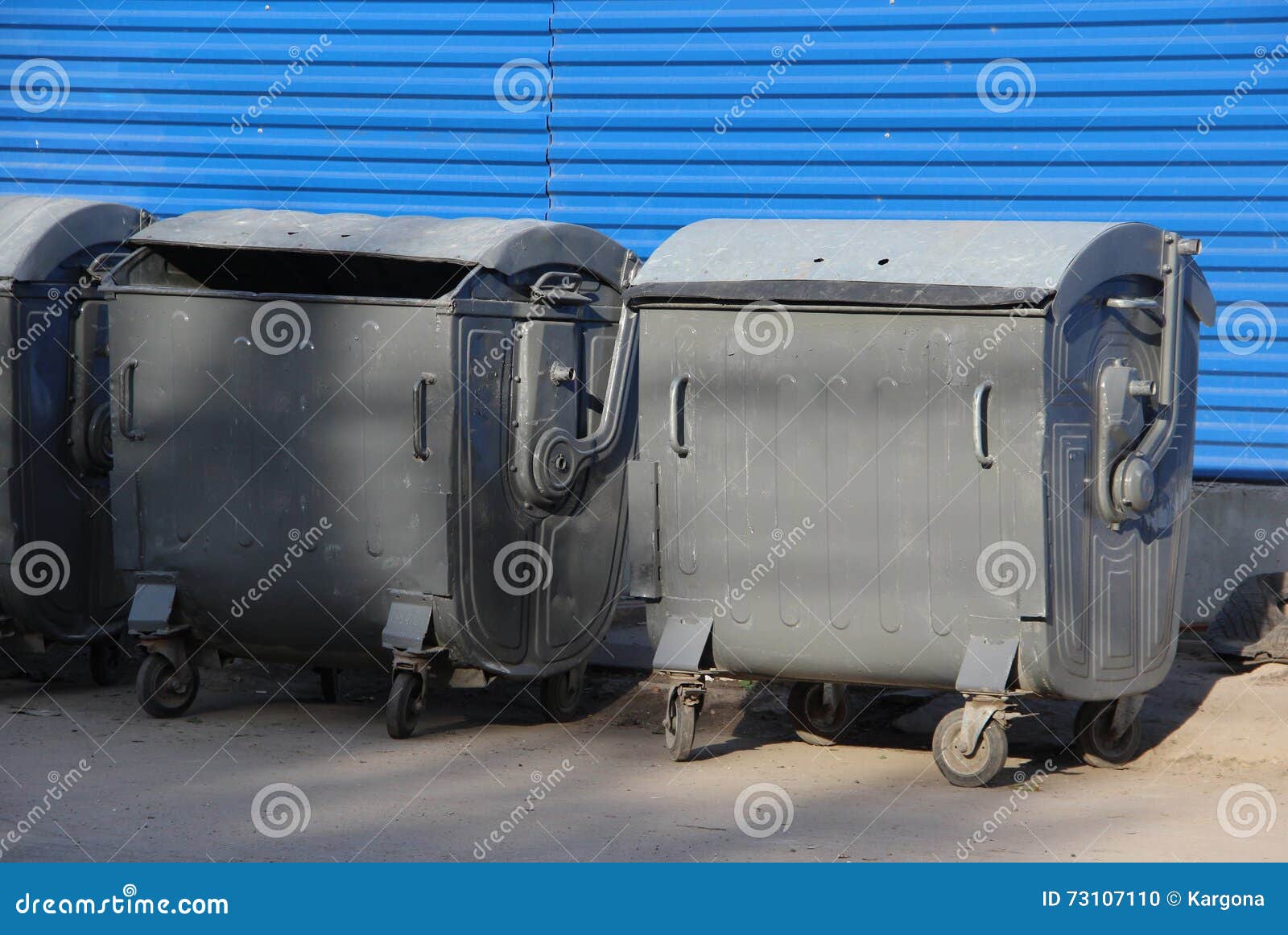 Grey Waste Containers on the City Street Stock Photo - Image of ...