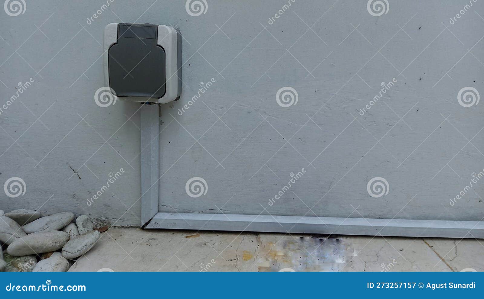 Grey White Outdoor Electrical Outlet and Its Cable Stock Image - Image ...