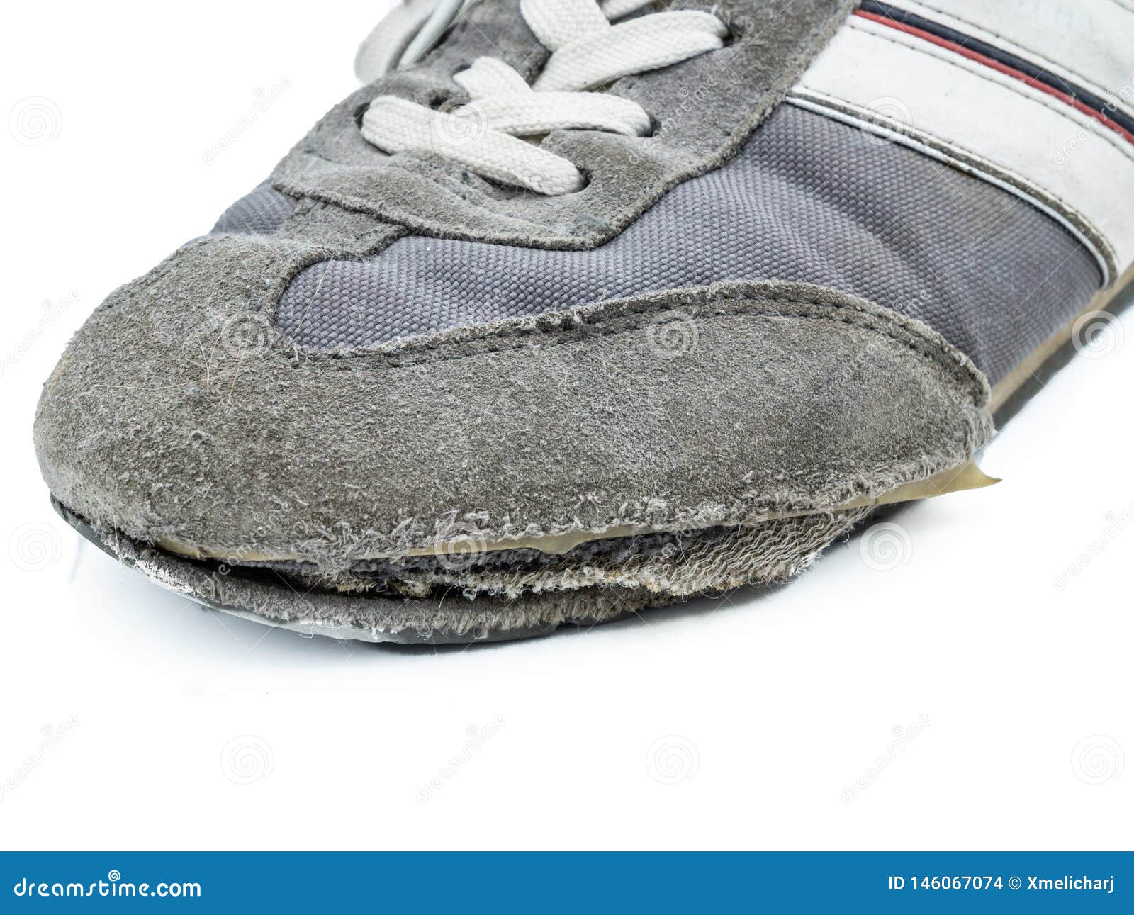 Grey and White Torn Shoe on White Background Stock Photo - Image of ...