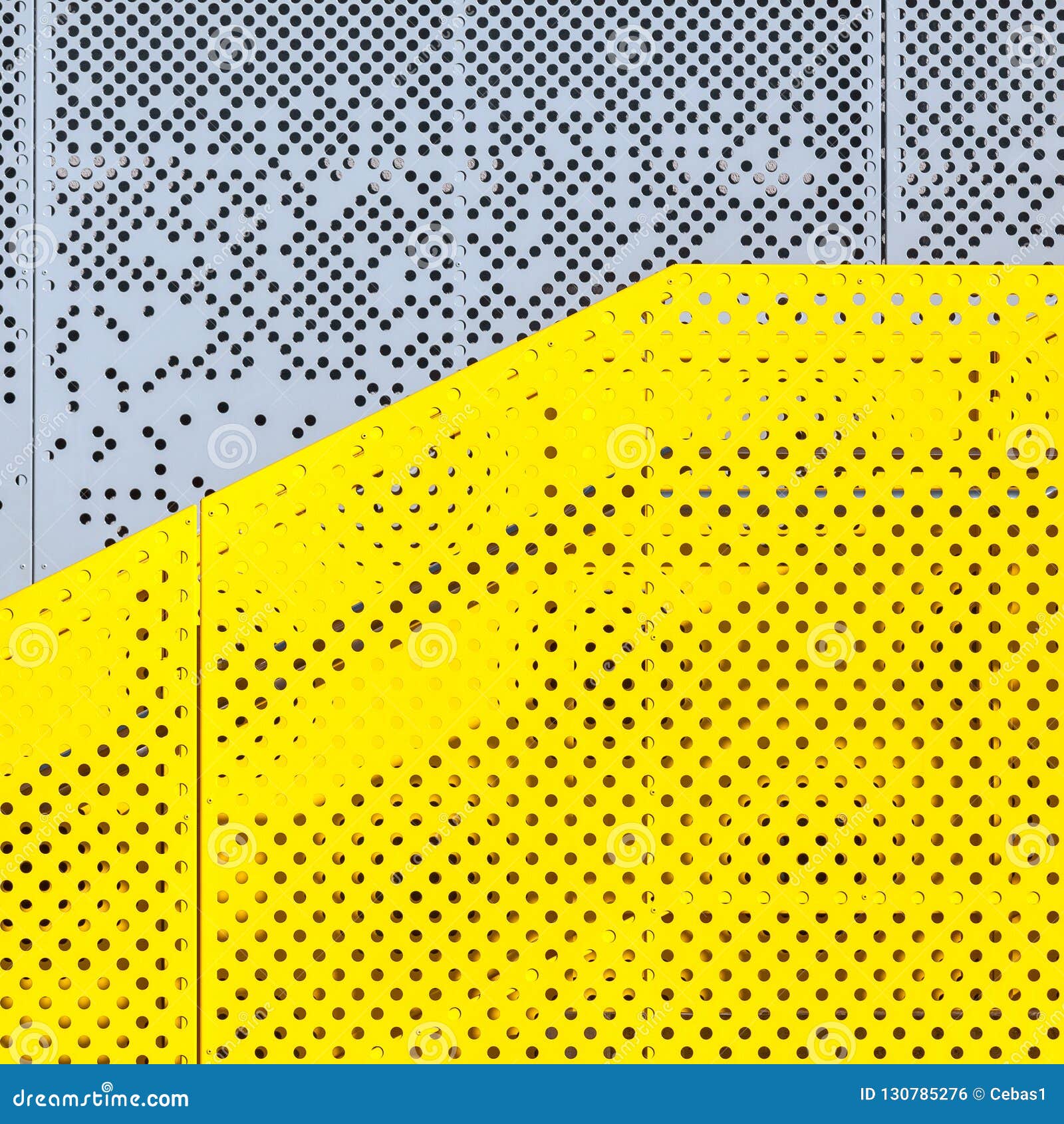 Grey and Yellow Perforated Industrial Metal Background Stock Photo ...