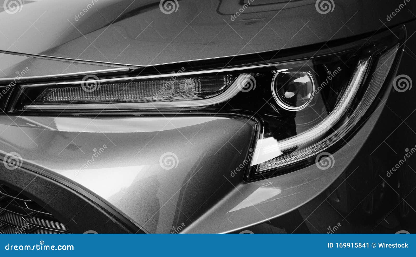Greyscale Closeup of a Grey Modern Car Headlight Under the Lights Stock ...