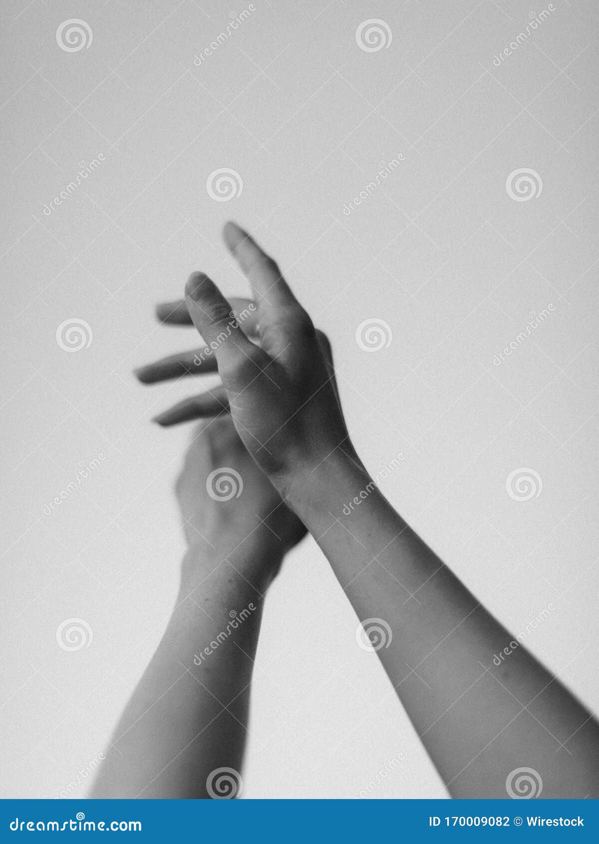 Greyscale of Human Hands Under the Lights Against a White Background ...