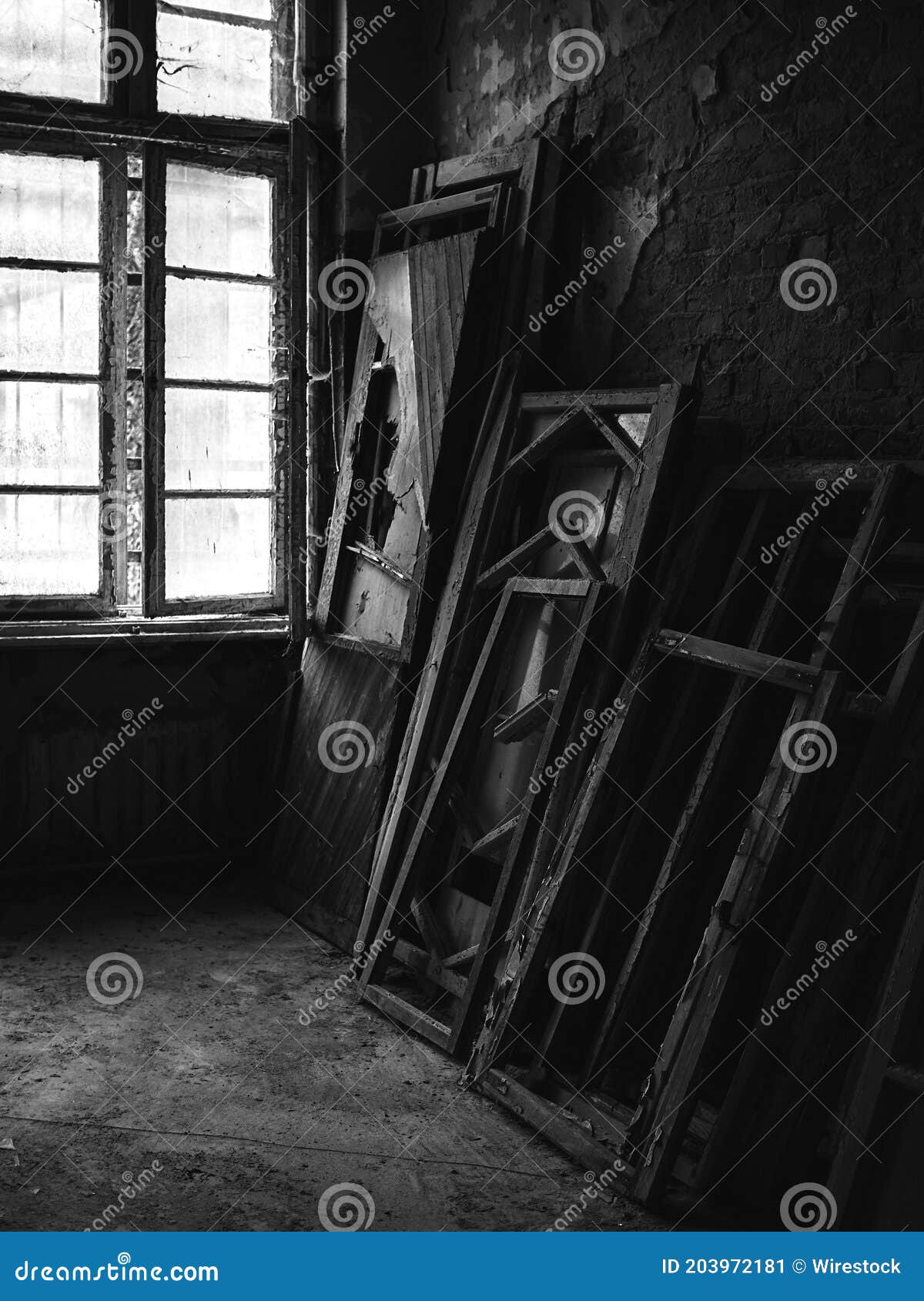 Greyscale Shot of Broken Windows in a Creepy Abandoned Room Inside of a ...