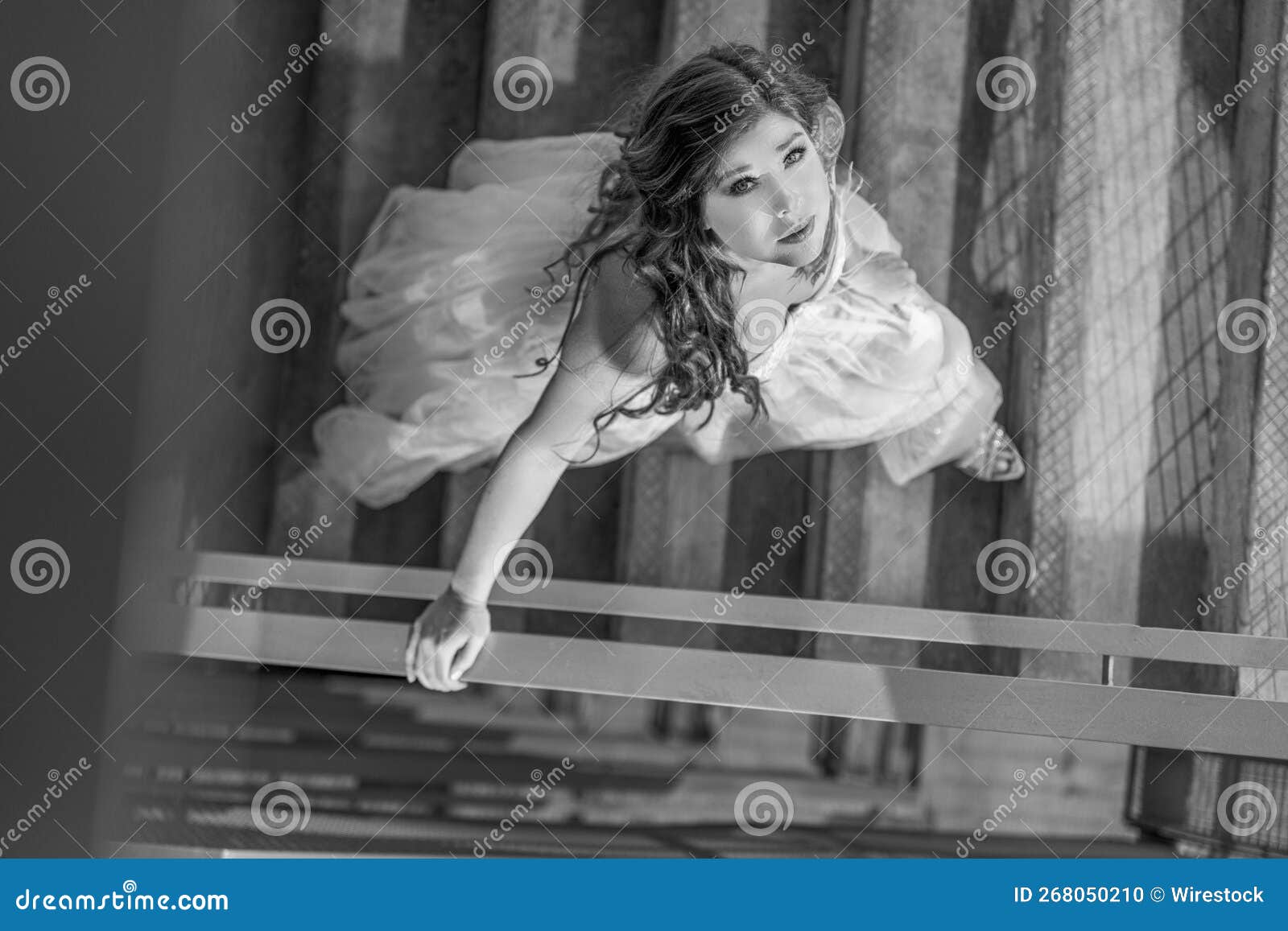 Greyscale Top View Shot of a Girl in Dress Running Up the Stairs Stock ... Greyscale Top View Shot of a Girl in Dress Running Up the Stairs Stock ...