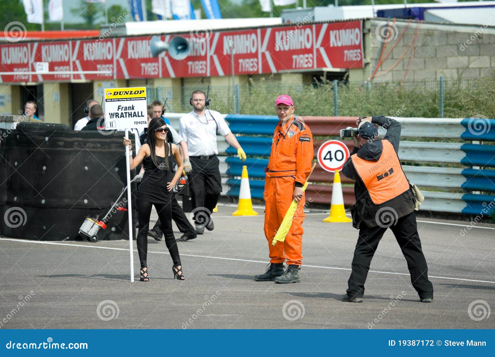 The Grid Girl Announces A Five-minute Readiness Before The Start ...