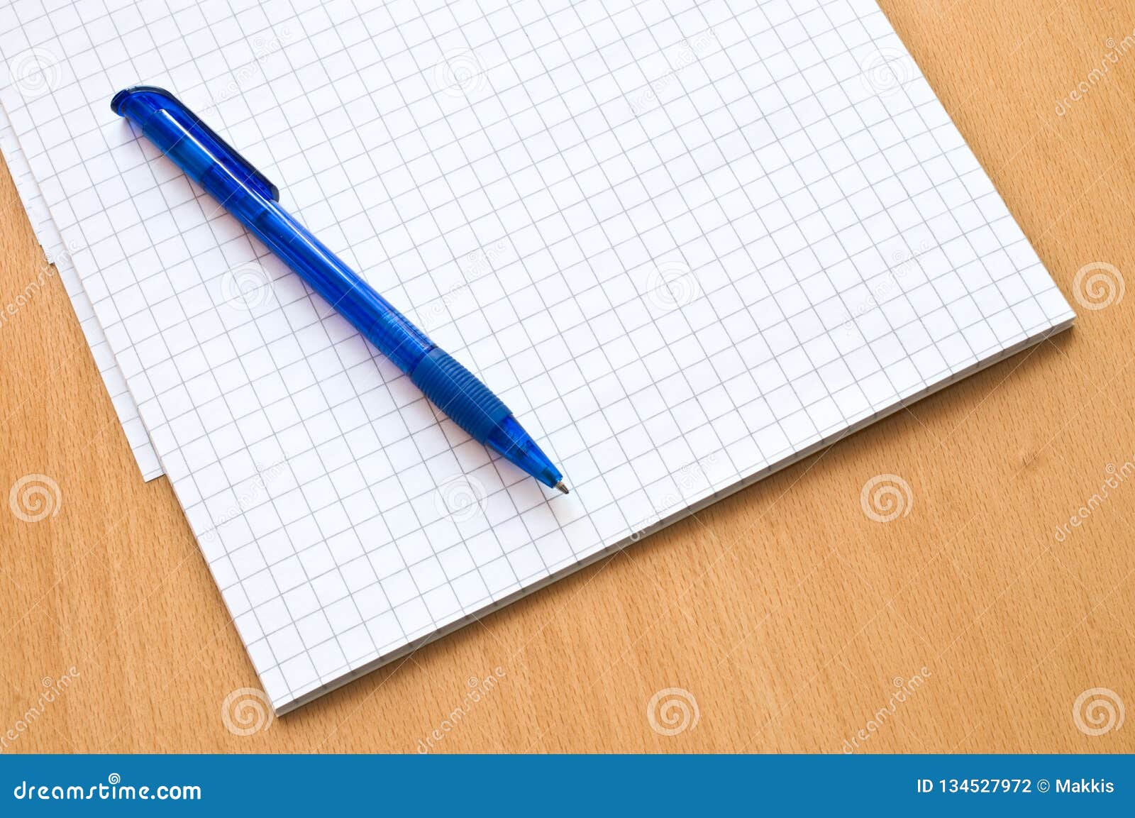 Grid Paper and Pen on the Table Stock Photo - Image of work, wood ...