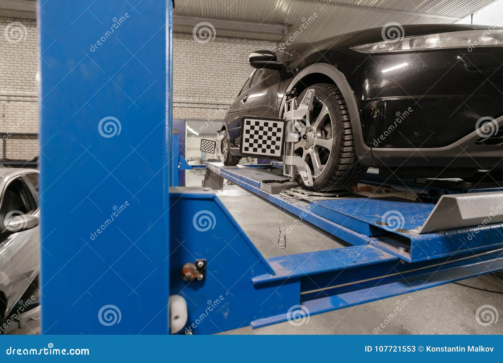 Grid Sensor Sets Mechanic On Auto. Car Stand With Sensors Wheels For ...