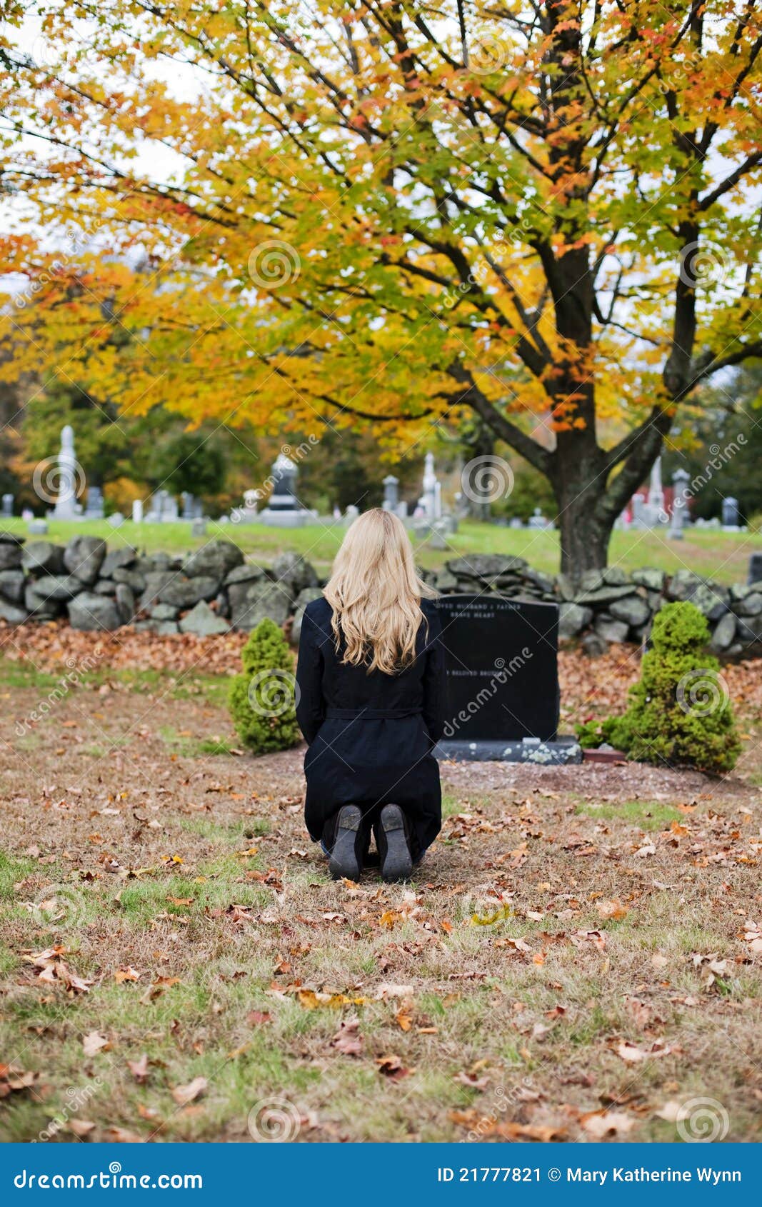 Grieving woman in cemetery stock image. Image of kneel - 21777821
