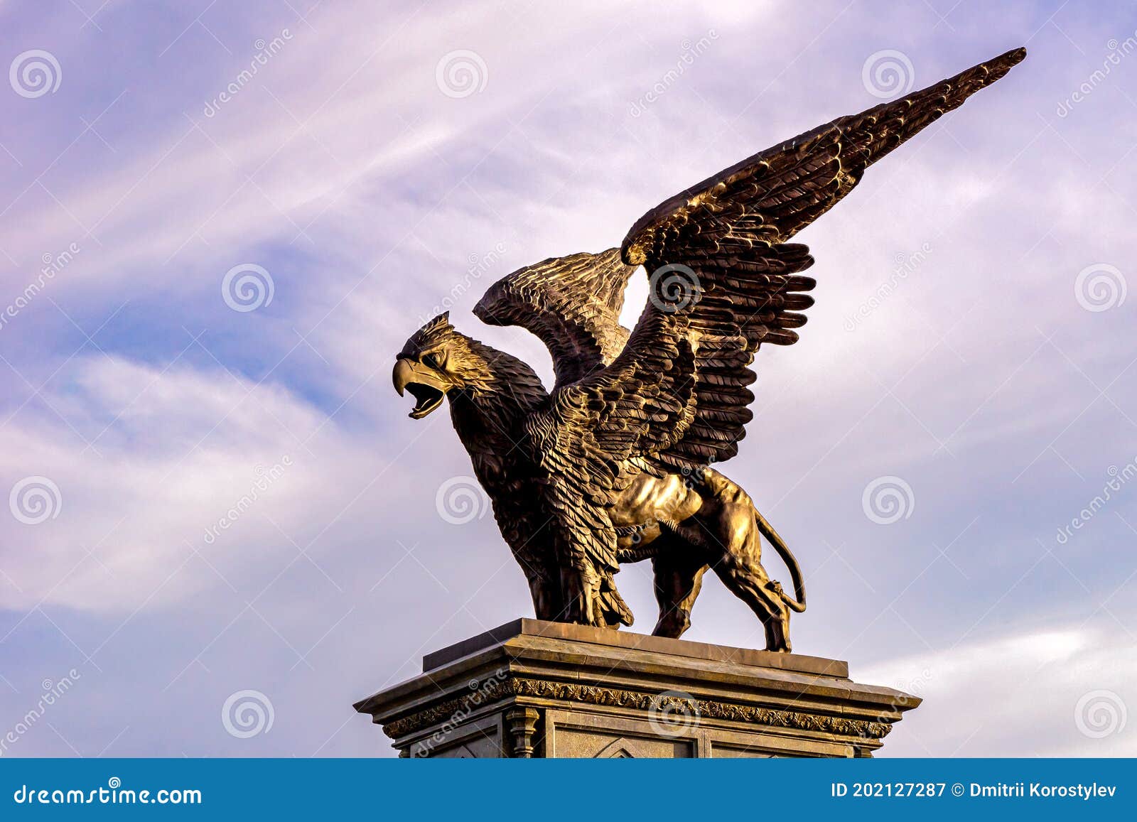 Griffon Statue Against the Background of the Evening Sky, Selective ...