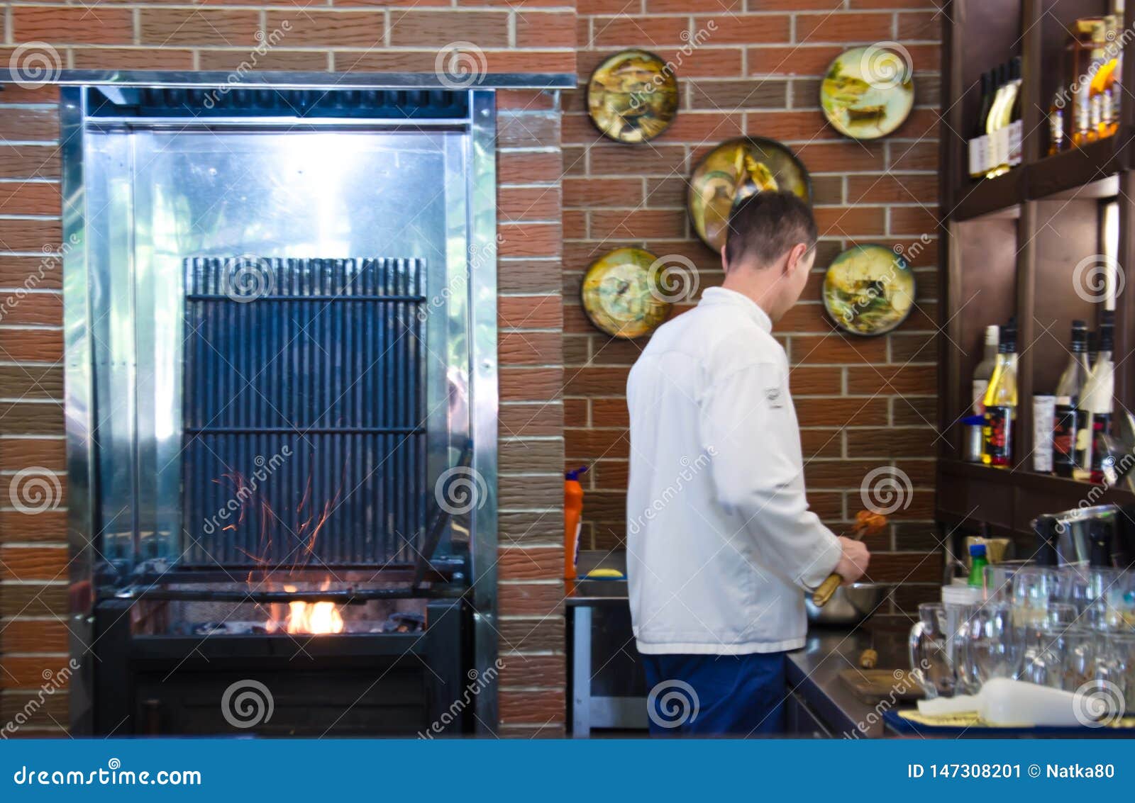 Grill in bar and cook back editorial photo. Image of background - 147308201