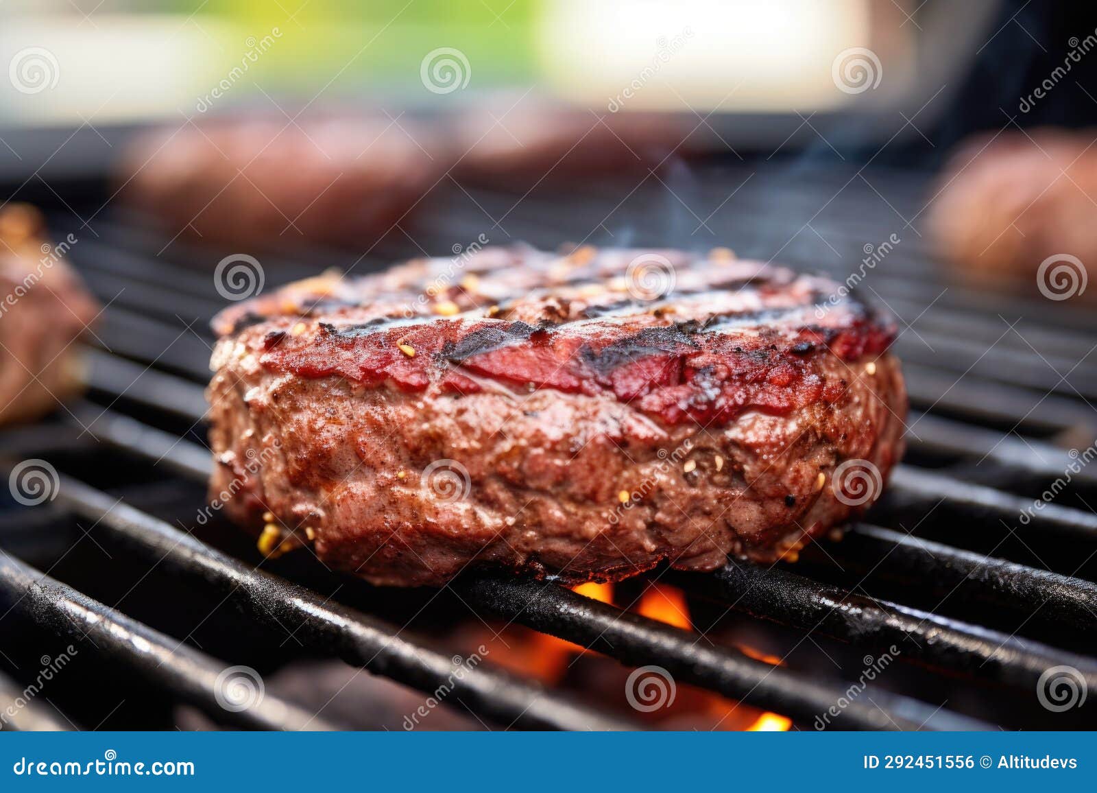 Grill with a Closeup View of a Single Burger Patty Stock Photo - Image ...