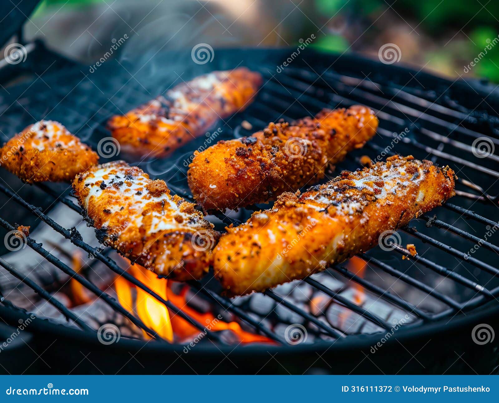 A Grill with Fish Sticks on it Stock Photo - Image of bratwurst ...