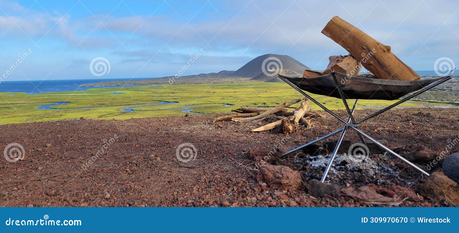 Grill with a Log with the Ocean in the Background Stock Photo - Image ...