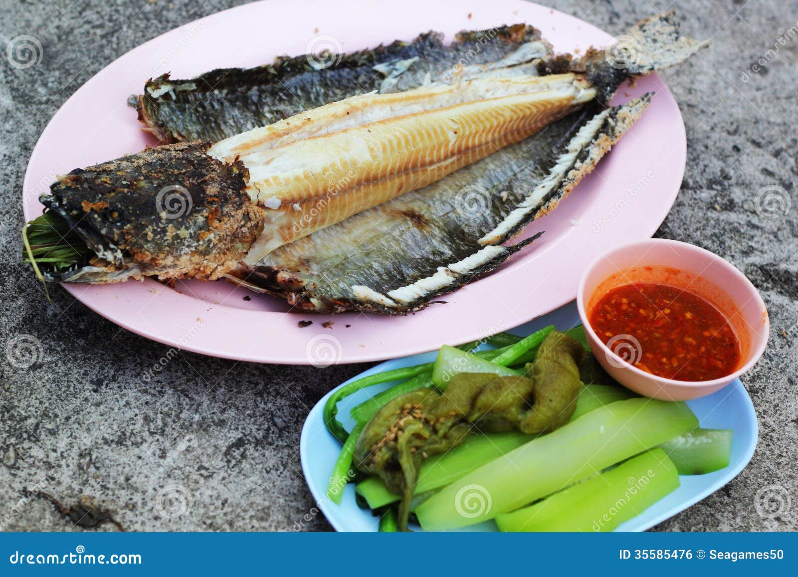 Grill Snake Head Fish with Salt Coated Stock Photo - Image of barbecued ...