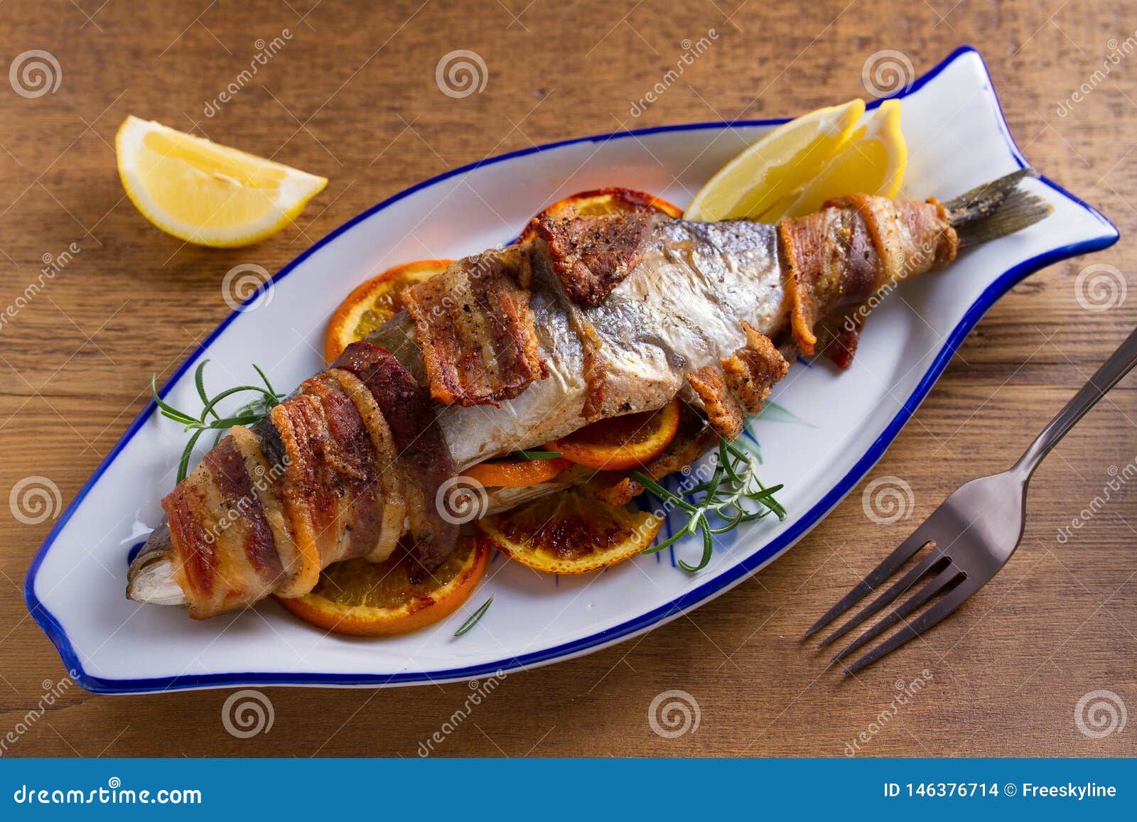 Grilled Bacon-Wrapped Whitefish. Fish Wrapped with Bacon. Stock Photo ...