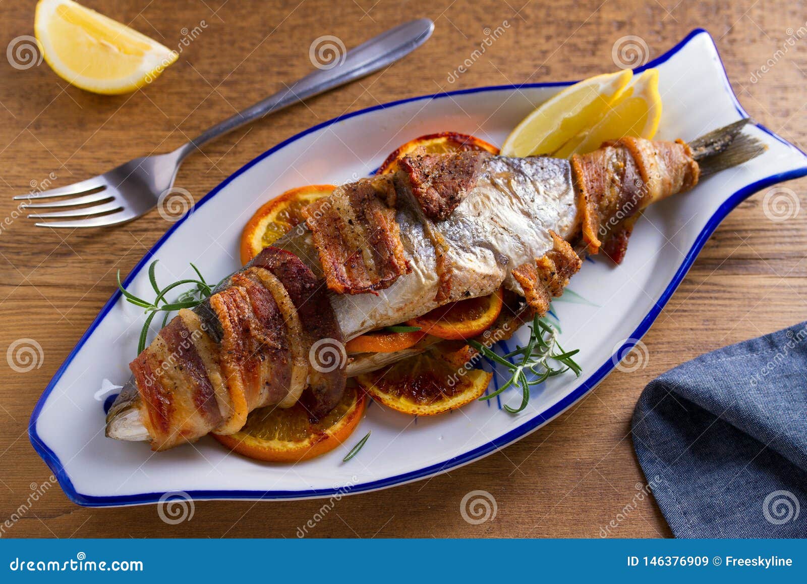 Grilled Bacon-Wrapped Whitefish. Fish Wrapped with Bacon. Stock Image ...