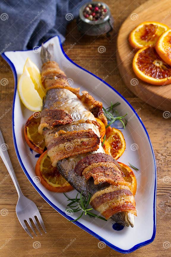 Grilled Bacon-Wrapped Whitefish. Fish Wrapped with Bacon. Stock Photo ...