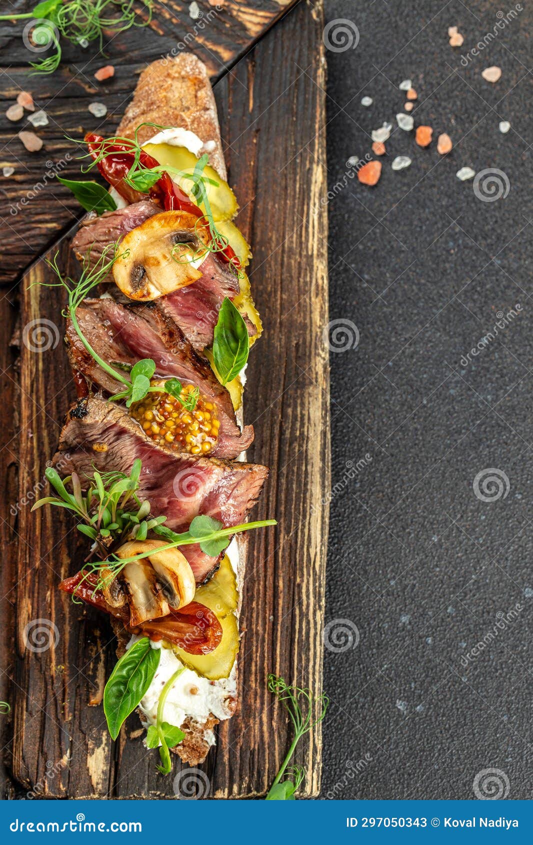 Grilled Baguette Steak Sandwich with Vegetables. Vertical Image. Top ...