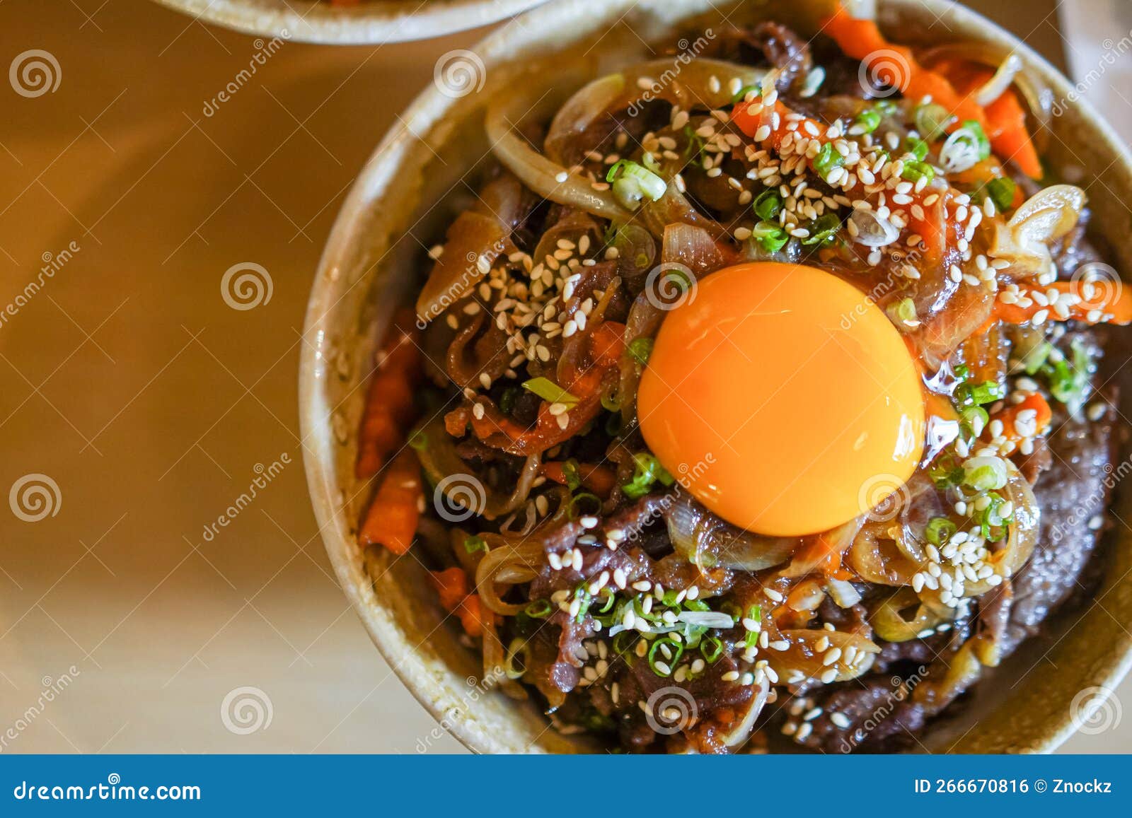 Grilled Beef Japan Style with Rice on Top with Raw Egg Stock Photo ...