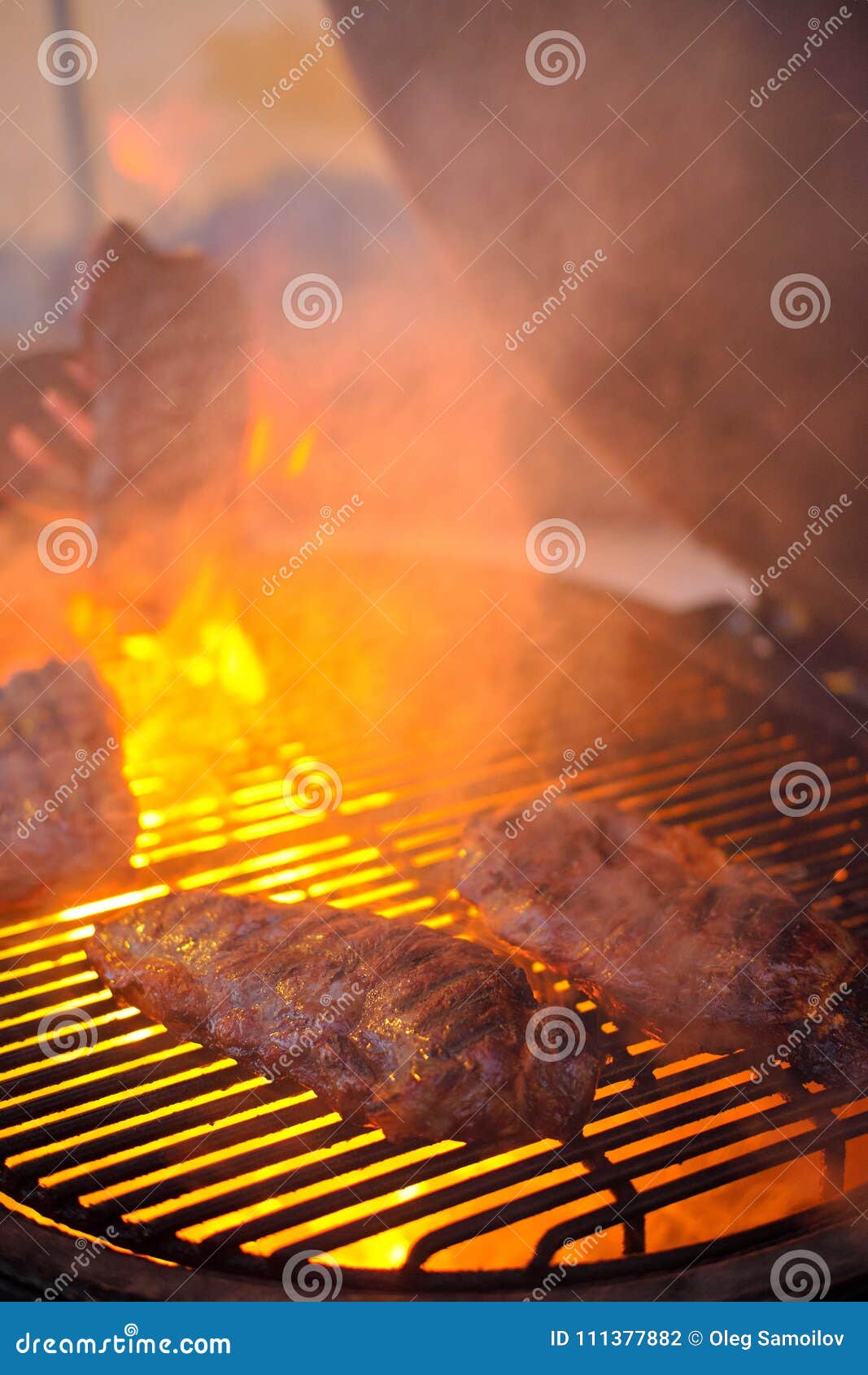 Delicious Grilled Beef Steak with Fire on Background Stock Photo ...