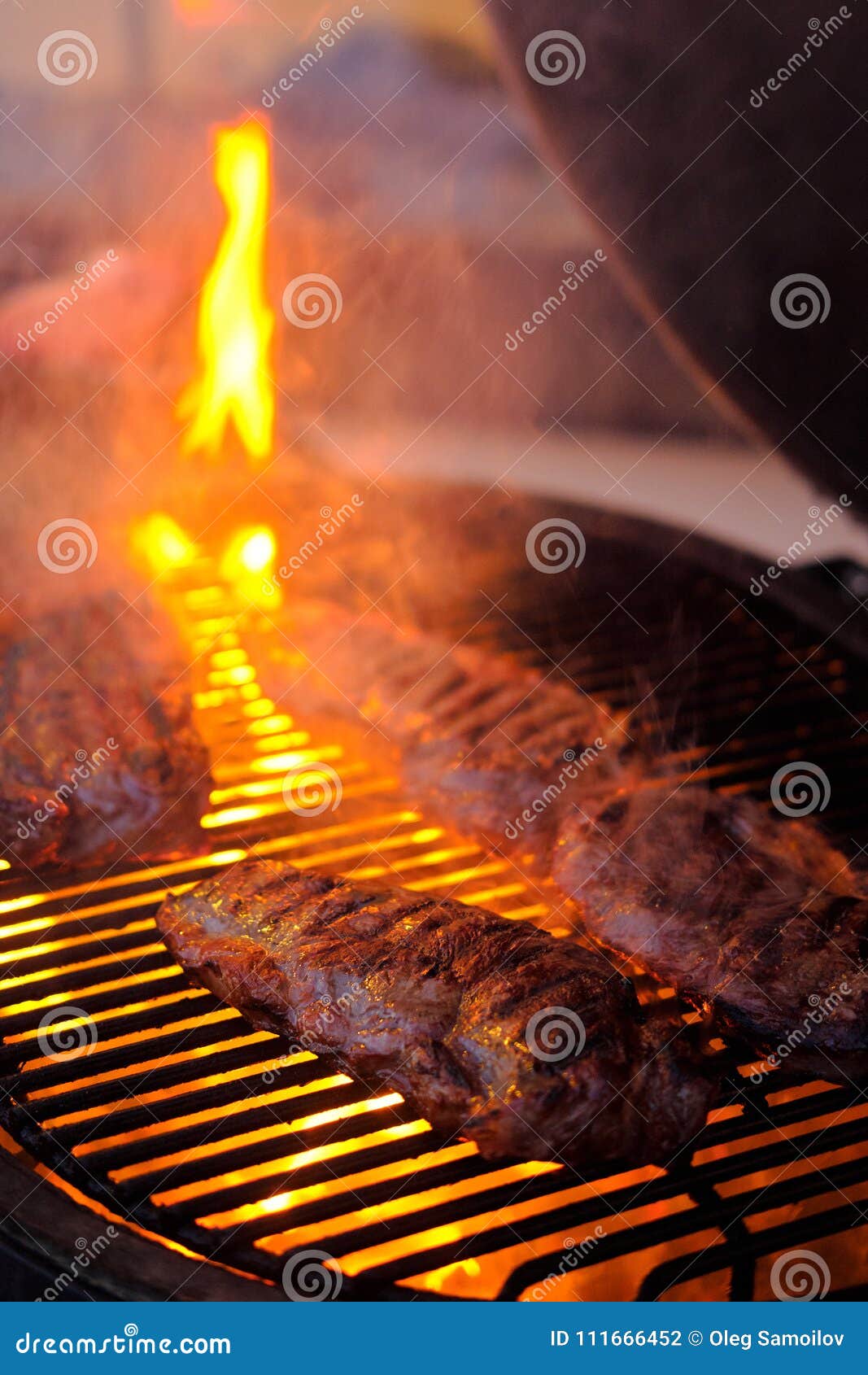 Delicious Grilled Beef Steak with Fire on Background Stock Photo ...