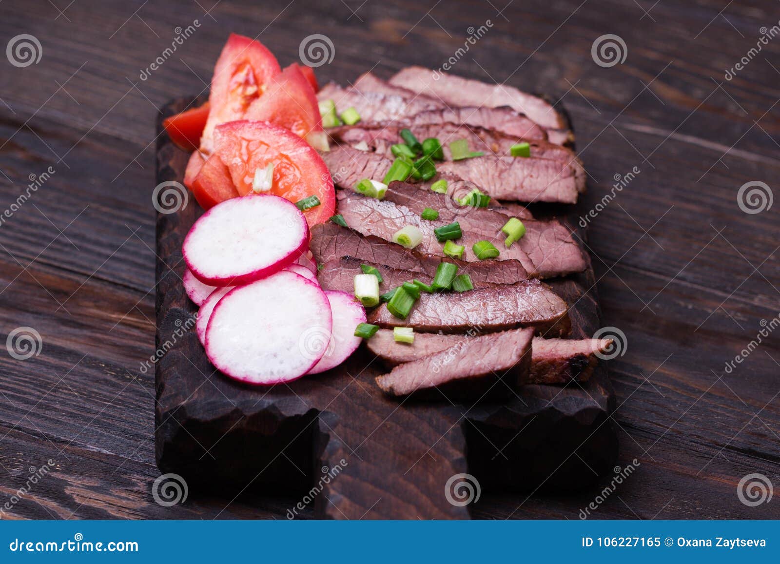 Grilled Beef Steak with Spring Onion, Tomato and Radish. Stock Image ...