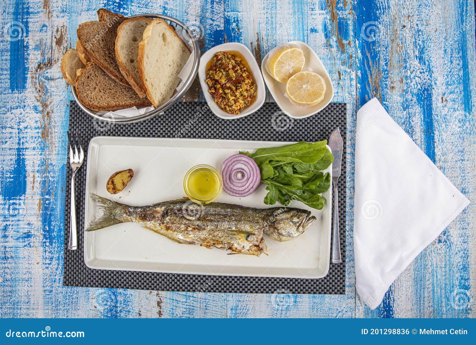 Grilled Bluefish Fish Platter. Bluefish and Appetizers in White Plate ...
