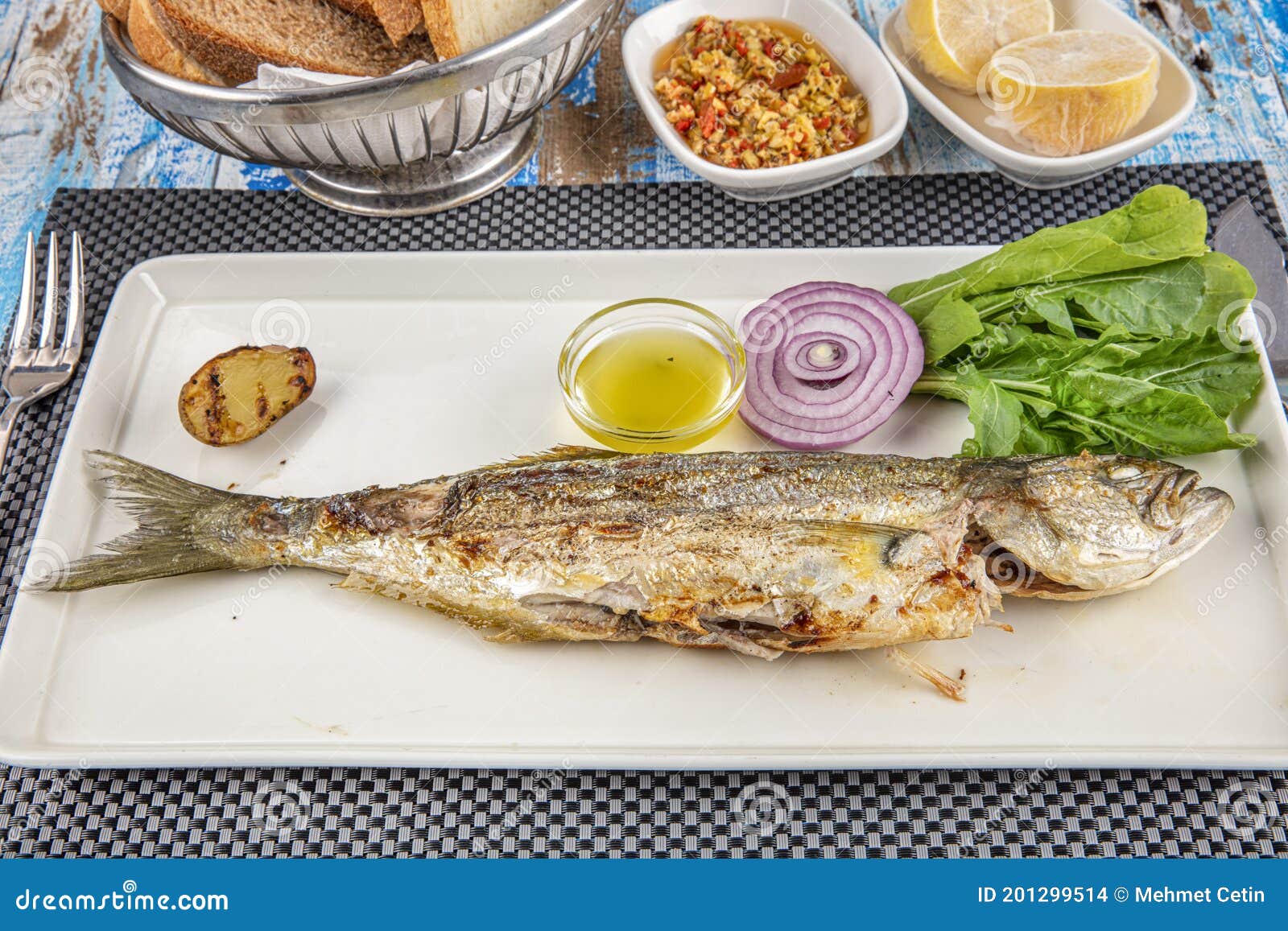 Grilled Bluefish Fish Platter. Bluefish and Appetizers in White Plate ...