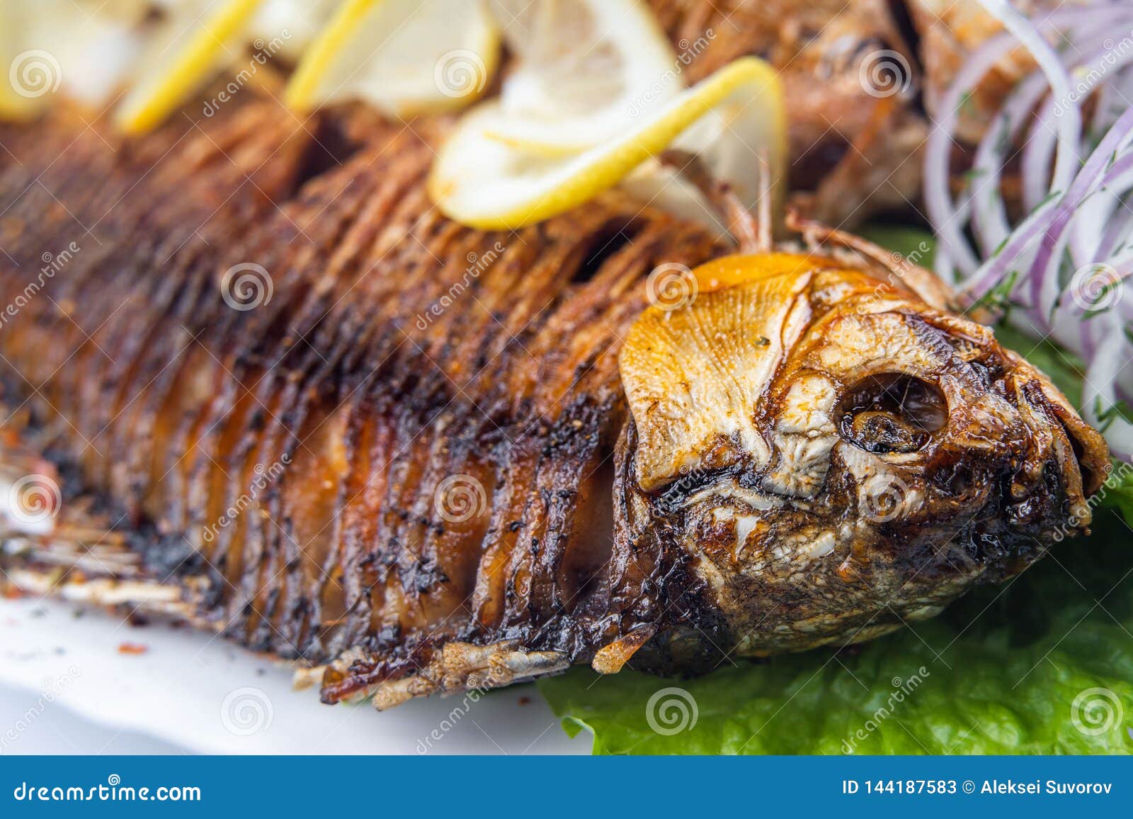 Grilled Carp Fish on the White Plate Over White Stock Image - Image of ...