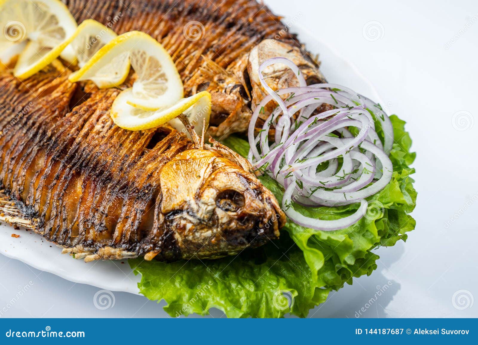 Grilled Carp Fish on the White Plate Over White Stock Image - Image of ...