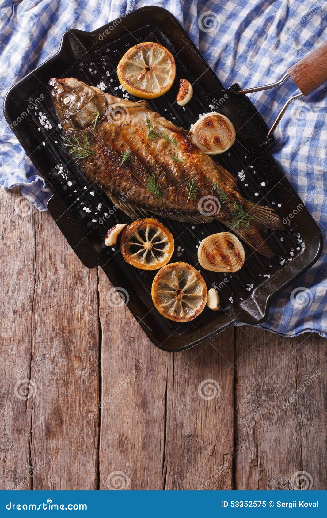 Grilled Carp with Lemon in a Pan , Vertical Top View Closeup Stock ...