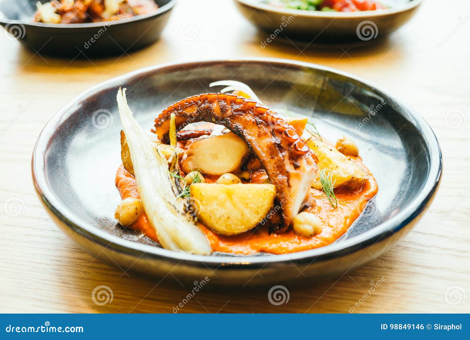 Grilled charred octopus stock photo. Image of restaurant - 98849146