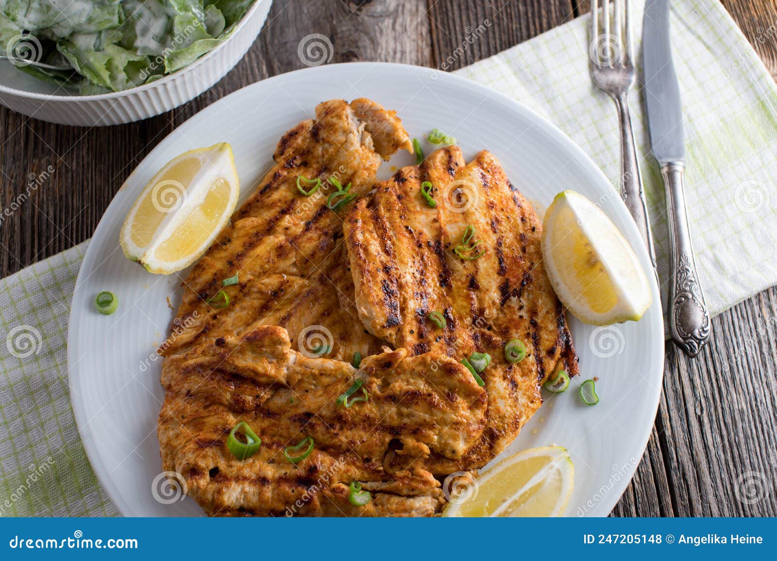 Grilled Chicken Steaks on a Plate with Lemon Stock Photo - Image of ...