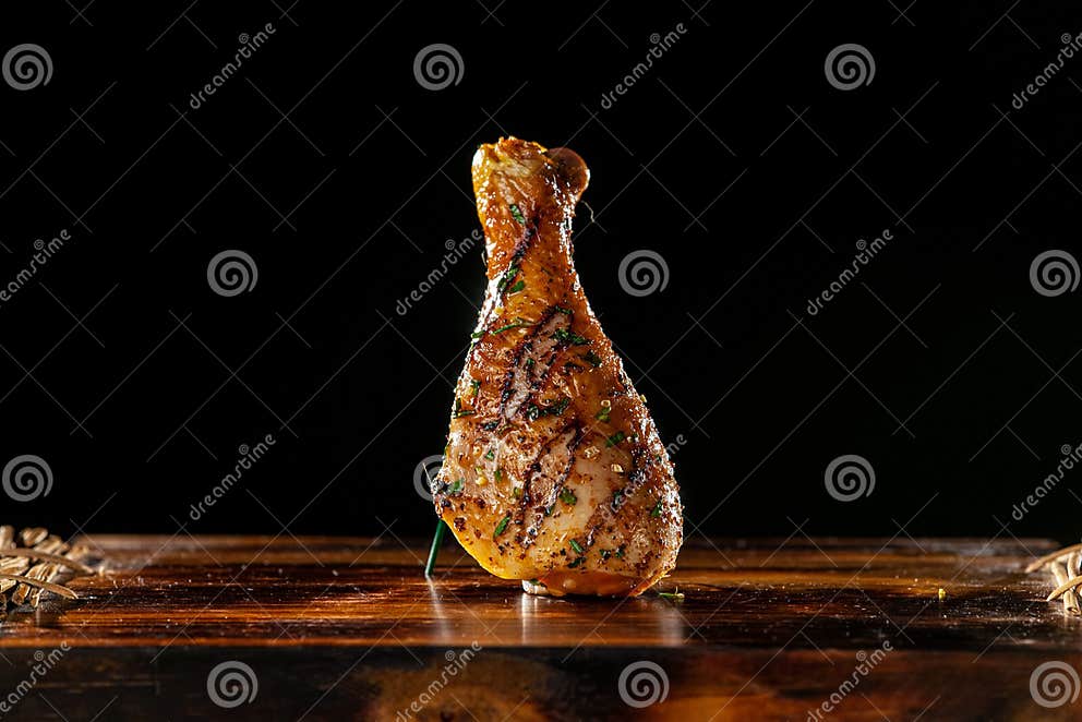 Grilled Chicken Leg on a Decorative Presentation Stock Photo - Image of ...