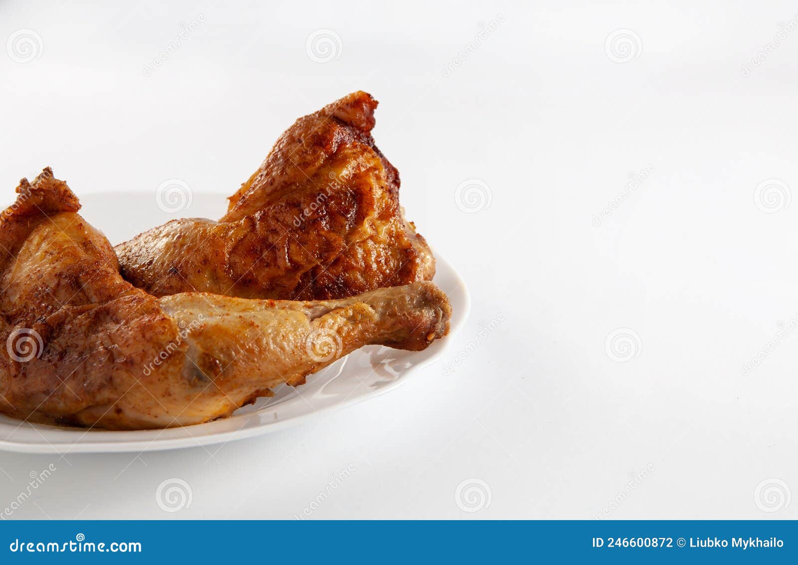 Grilled Chicken is on the Plate. on a White Background Stock Photo ...
