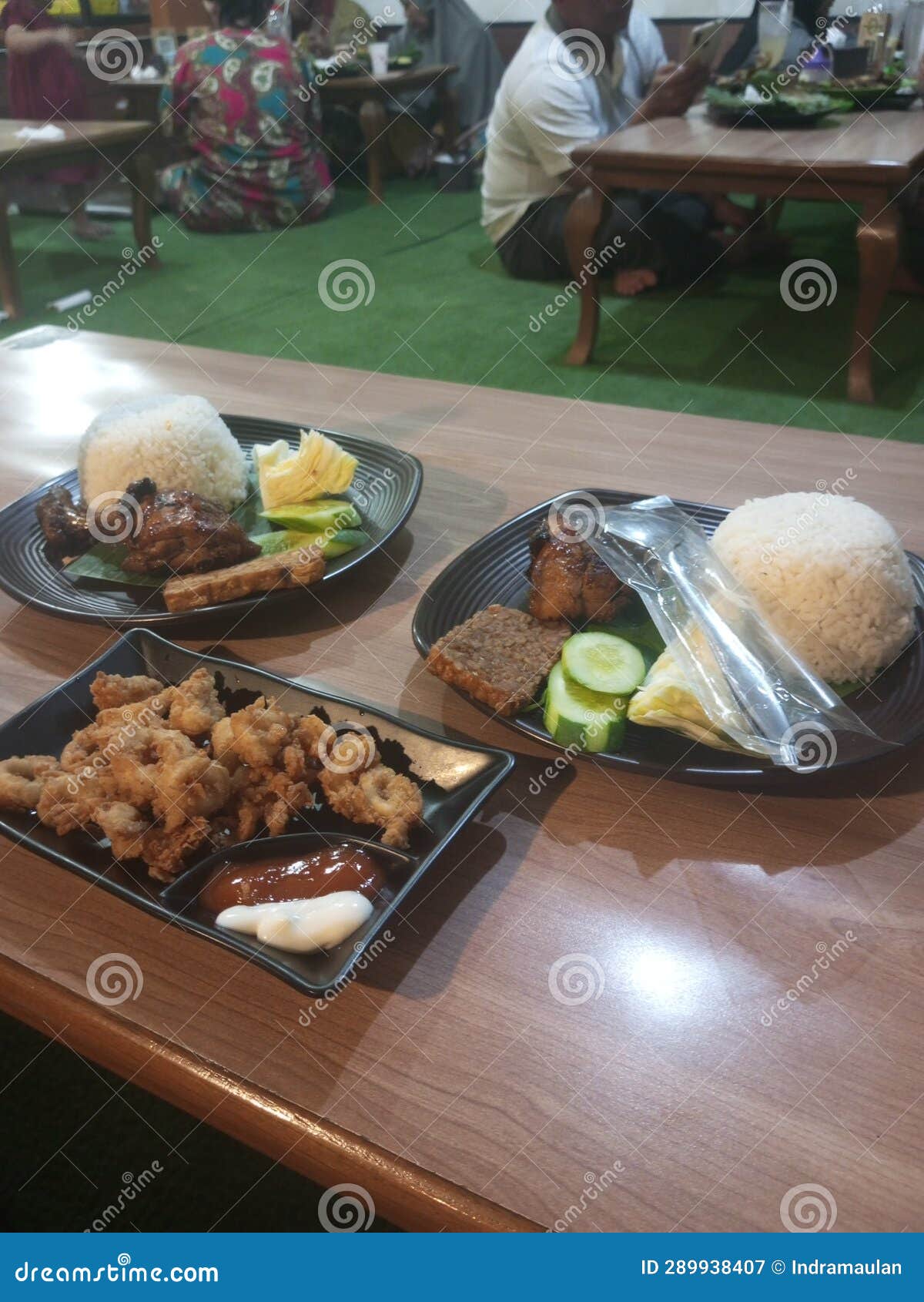 Grilled Chicken Rice, Typical Indonesian Crispy Squid Stock Image ...