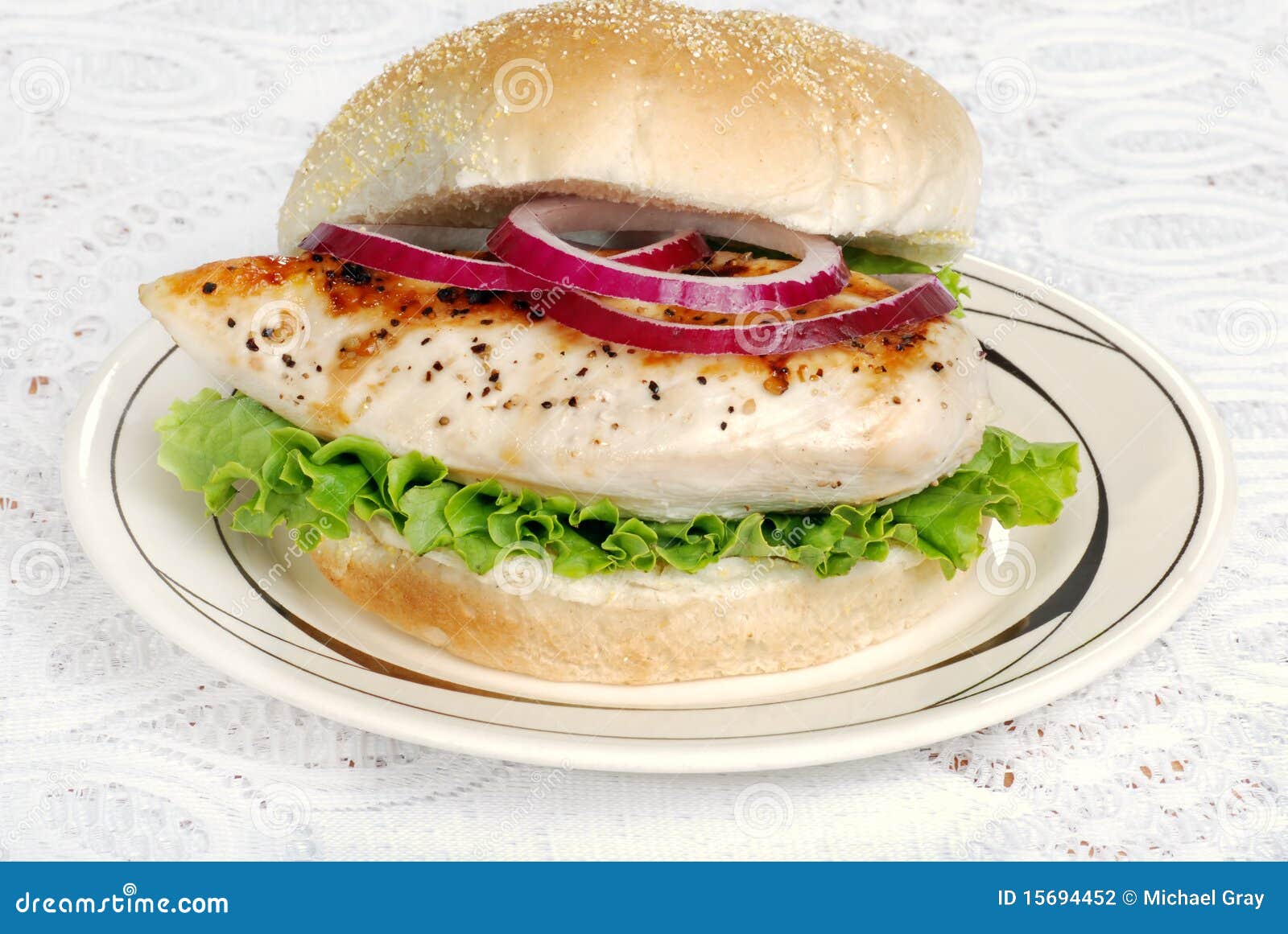 Grilled Chicken Sandwich with Red Onions Stock Photo - Image of roll ...
