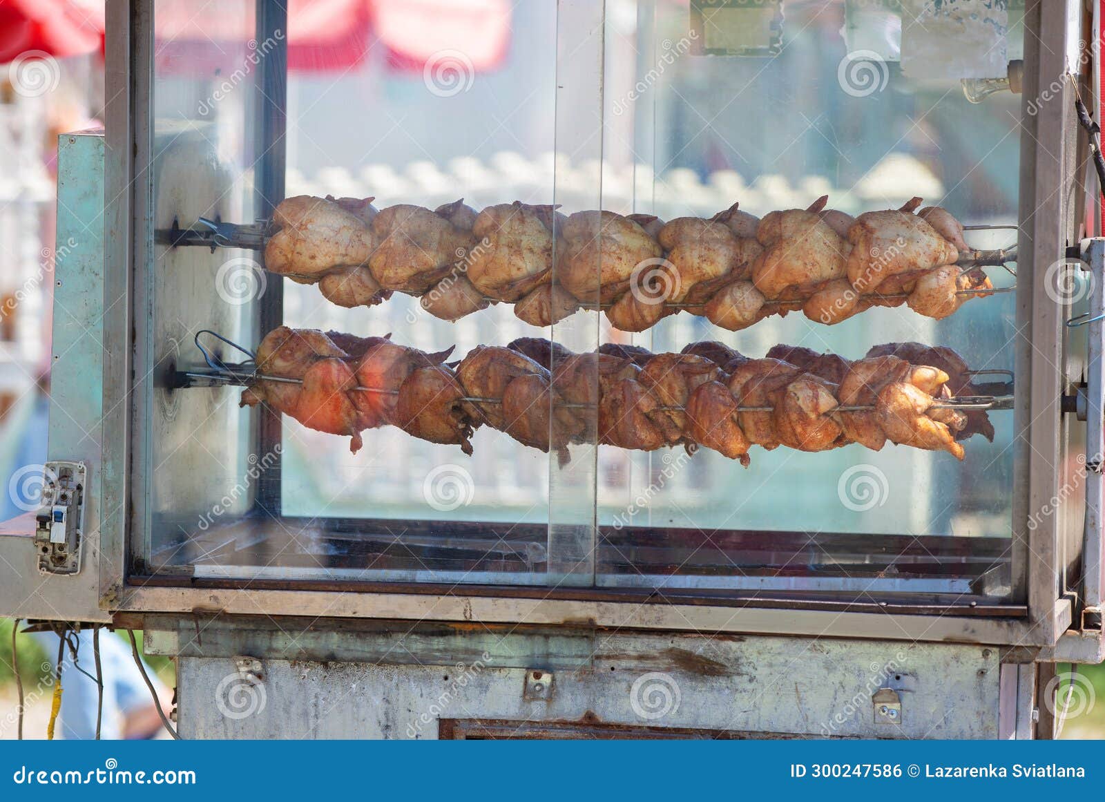 Grilled chicken on a spit stock photo. Image of steak - 300247586