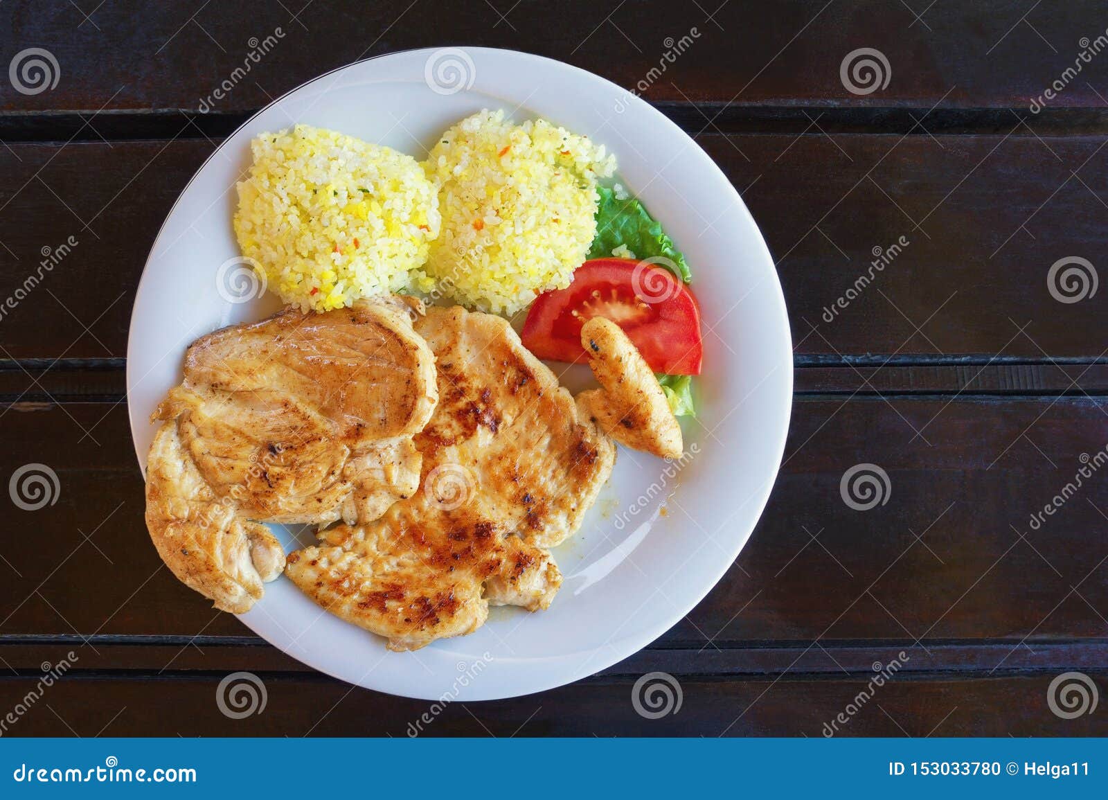 Grilled Chicken Steak with Rice on White Plate. Dark Rustic Background ...