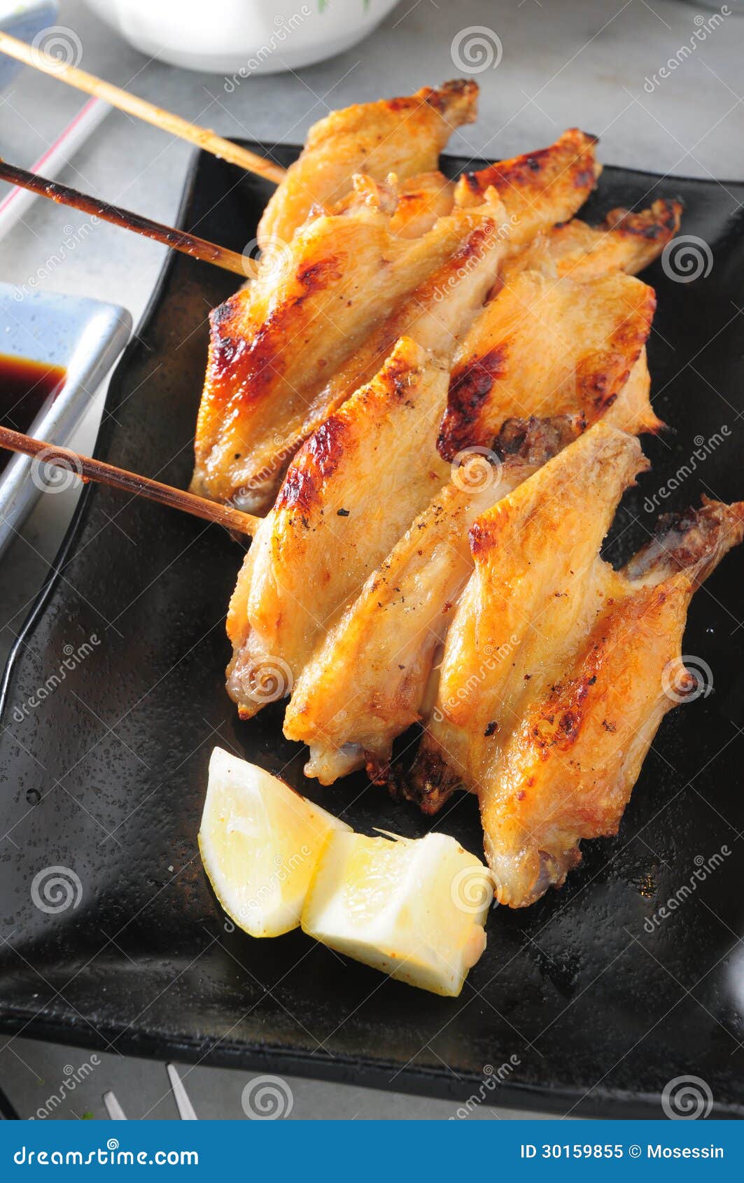 Grilled chicken wing stock image. Image of stick, sauce - 30159855