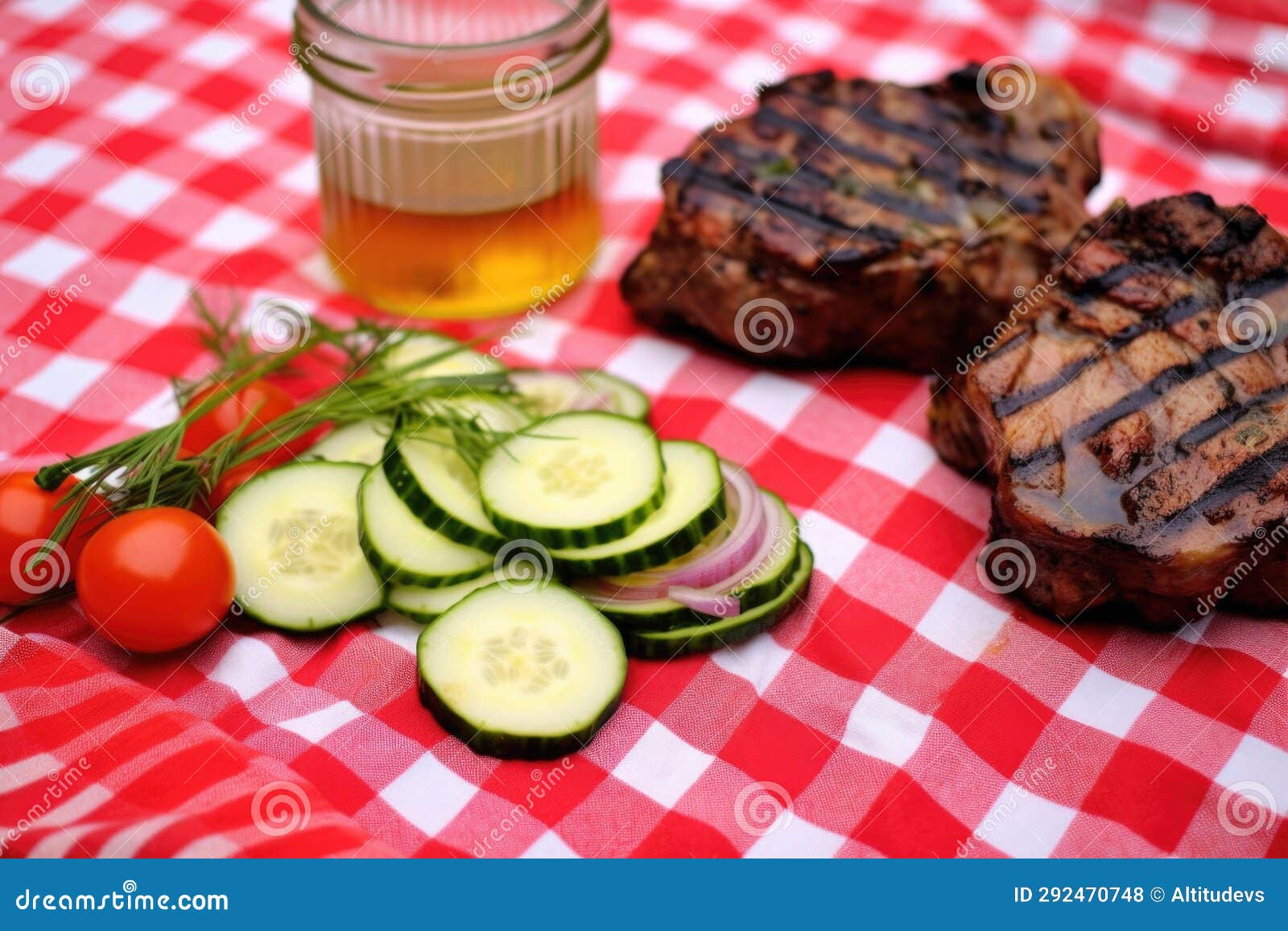 Grilled Chops on Red Checkered Picnic Cloth with Pickles and Bread ...