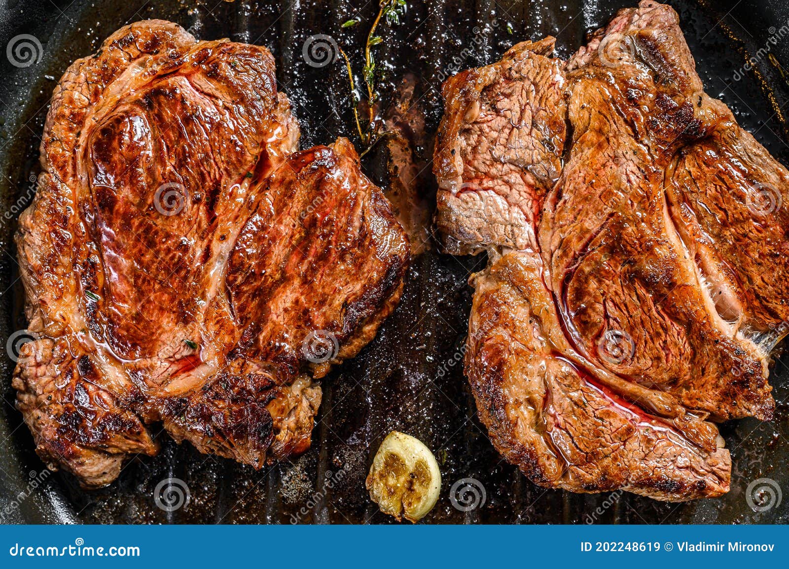 Grilled Chuck Eye Roll Steak in a Pan. Dark Background Stock Image ...