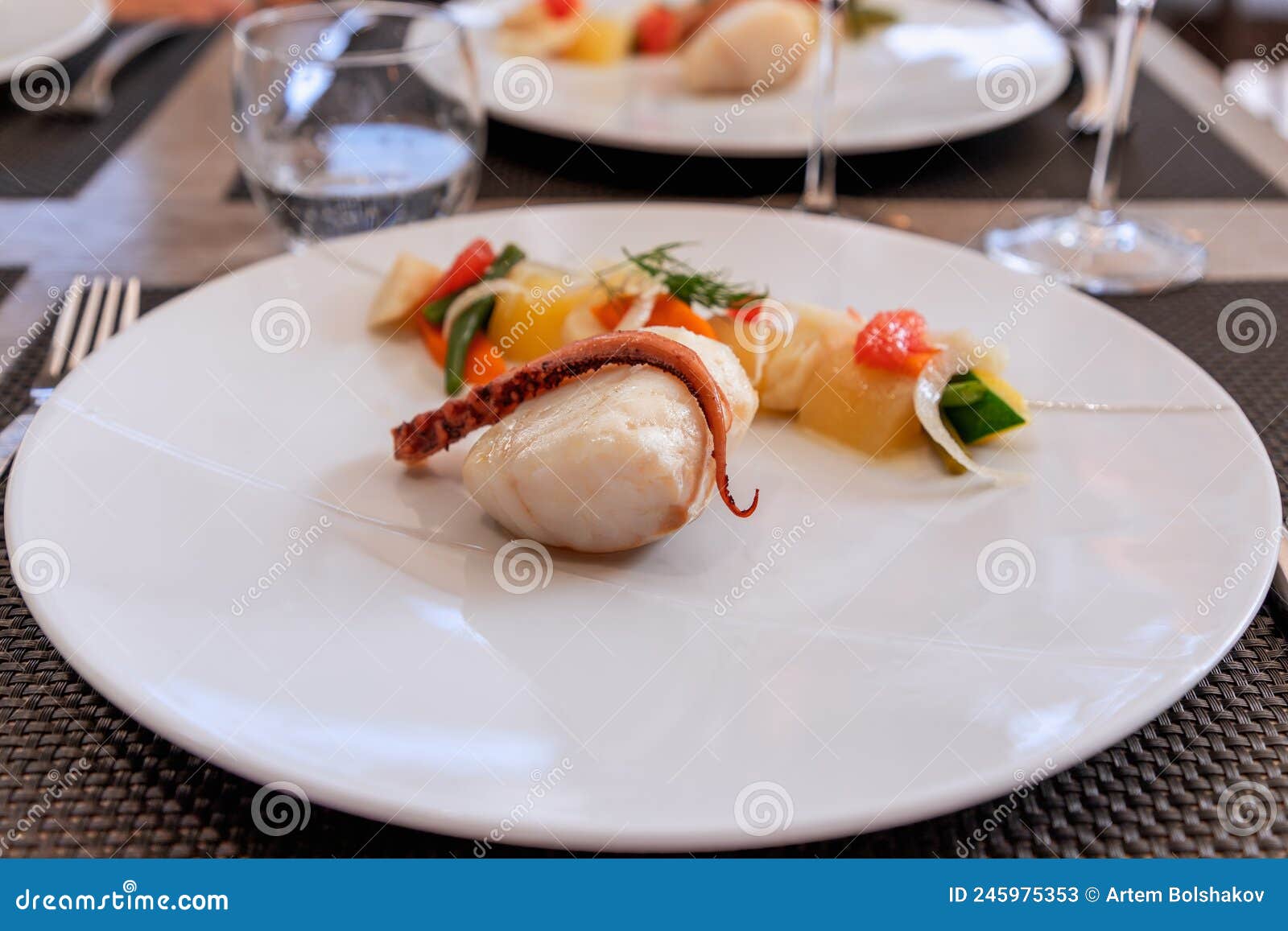 Grilled Cod Fish and Octopus Tentacles with a Garnish of Pickled ...